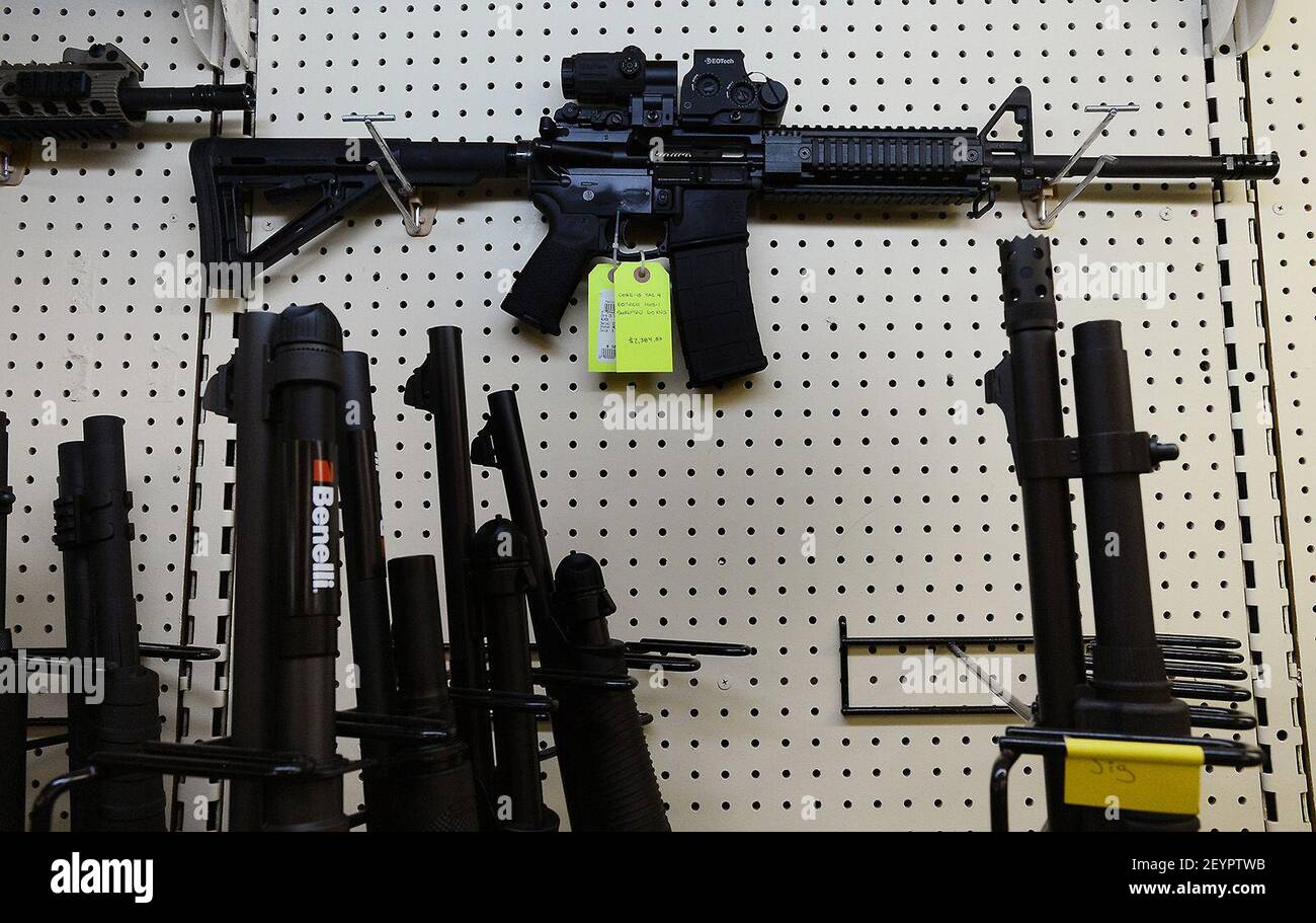 On display at a gun shop in Wendell, N.C., an AR-15 assault rifle ...