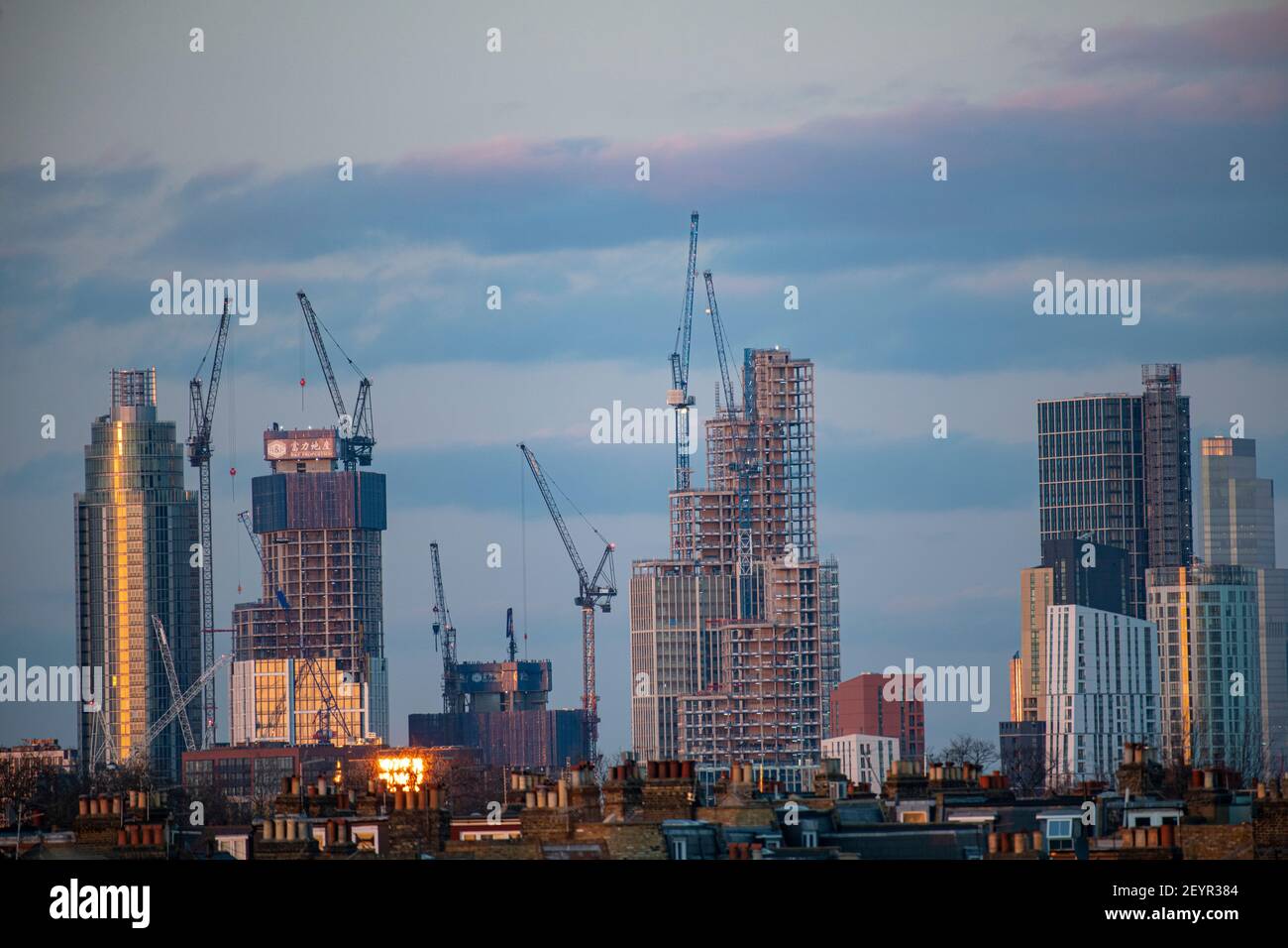 St George's Tower and surounding skyscrapers at dusk Stock Photo - Alamy