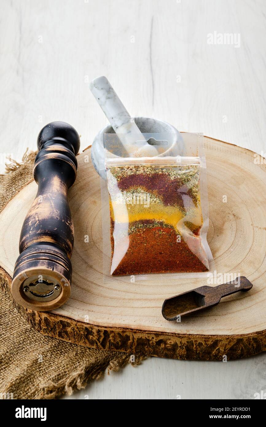 Mixture of different spices in plastic packaging Stock Photo - Alamy