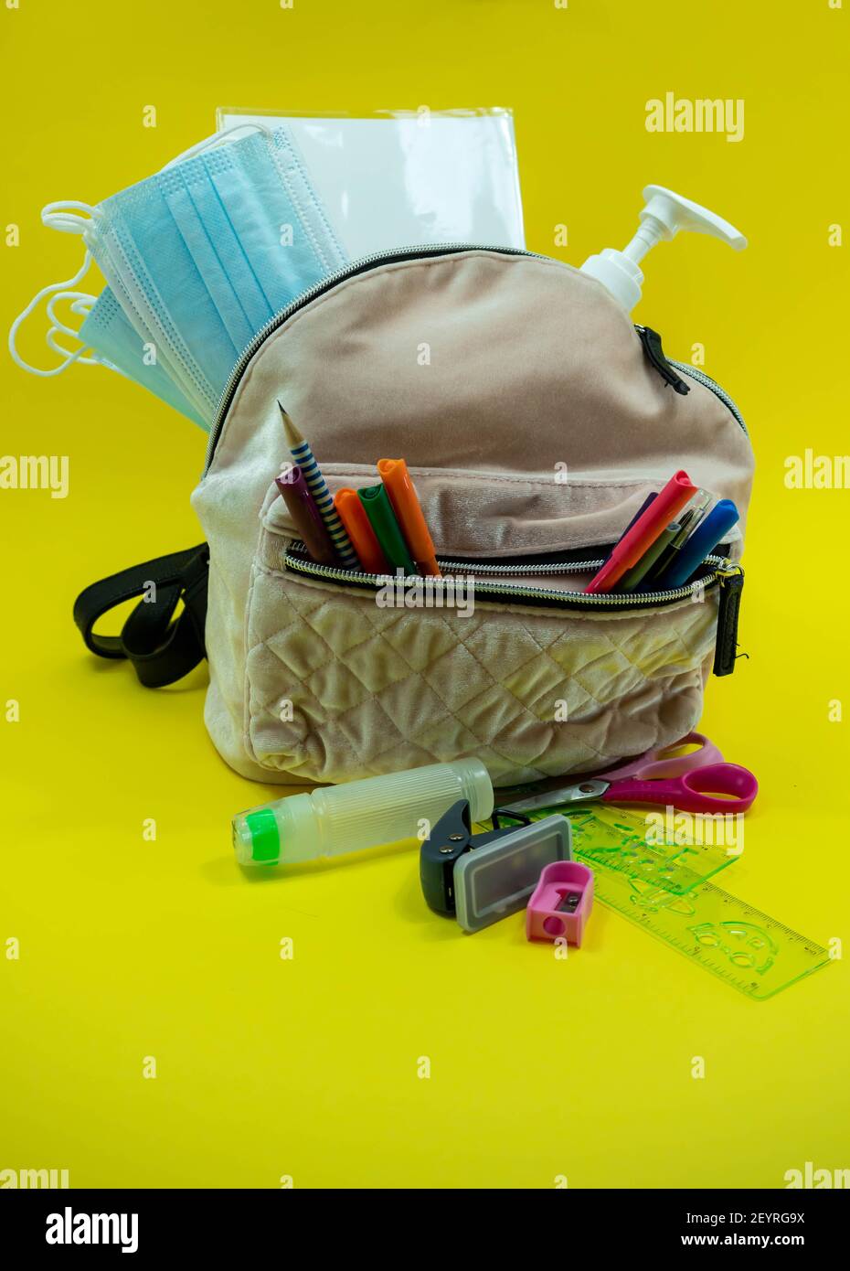 School supplies like pencil scissor eraser ruler watercolor mask ...