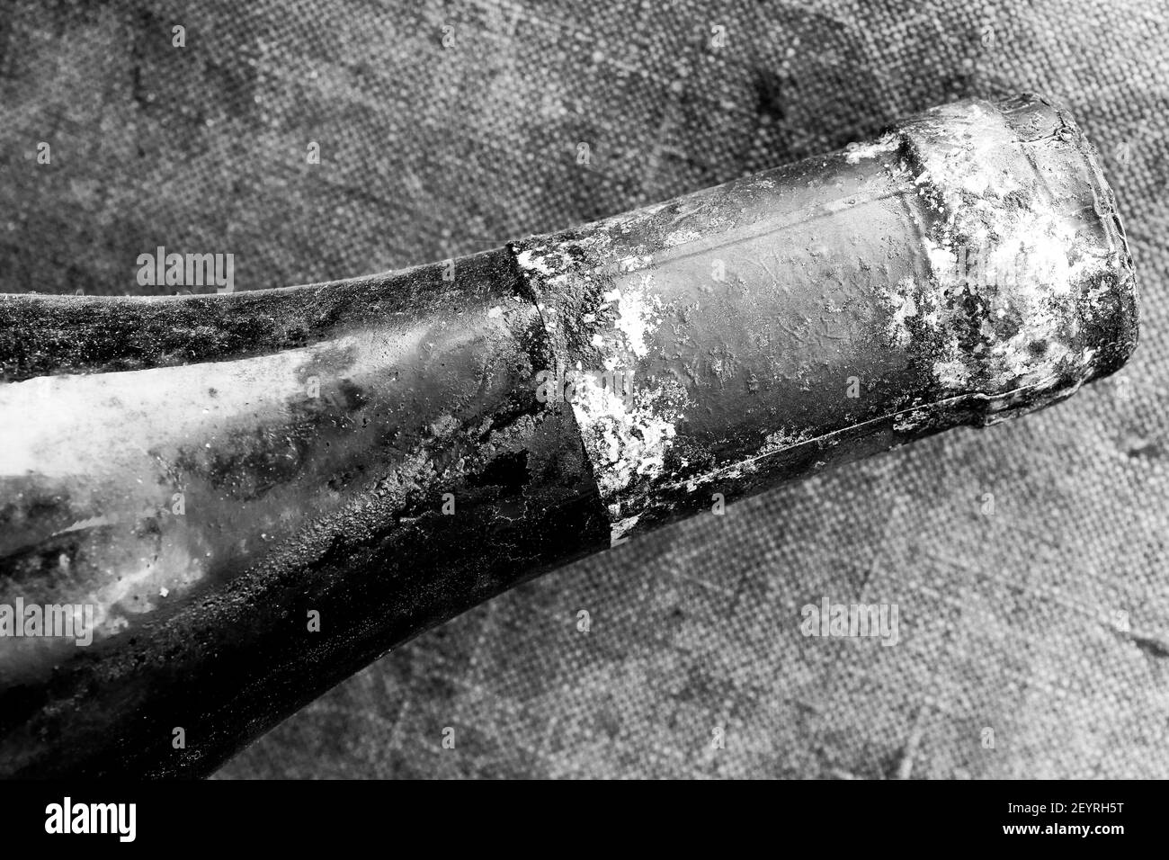 Damaged metal cap of an old red wine bottle, Lyon, France Stock Photo ...