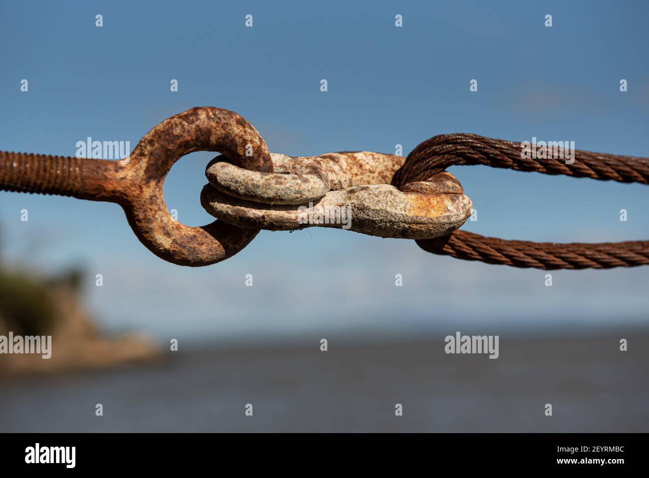 Traditional, old, rusty turnbuckle at a pier, viewed from close ...