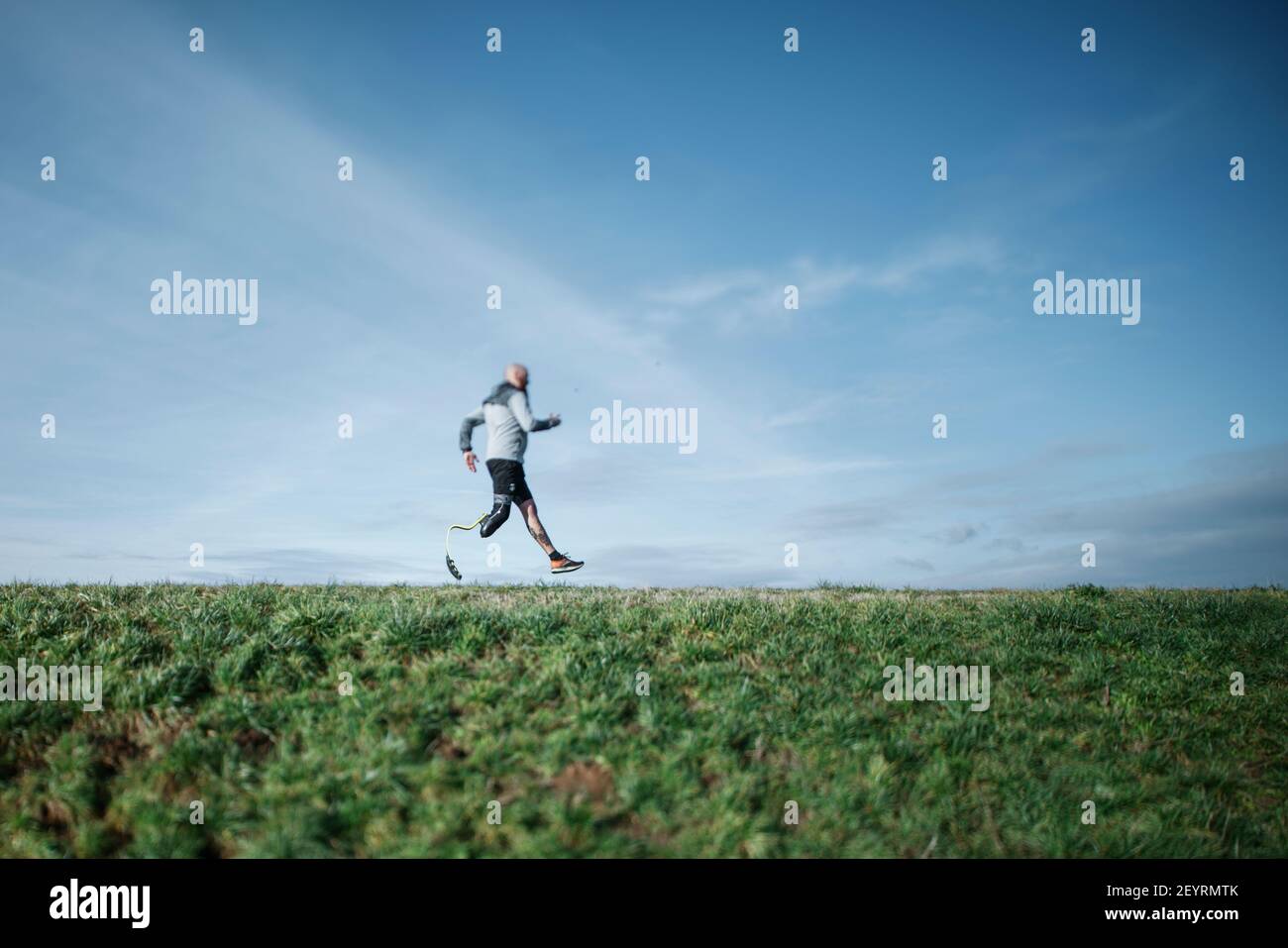 run training with sports prosthesis Stock Photo - Alamy