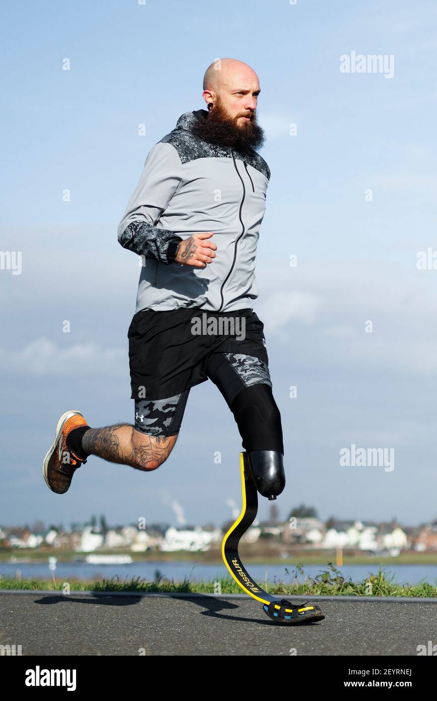 run training with sports prosthesis Stock Photo - Alamy