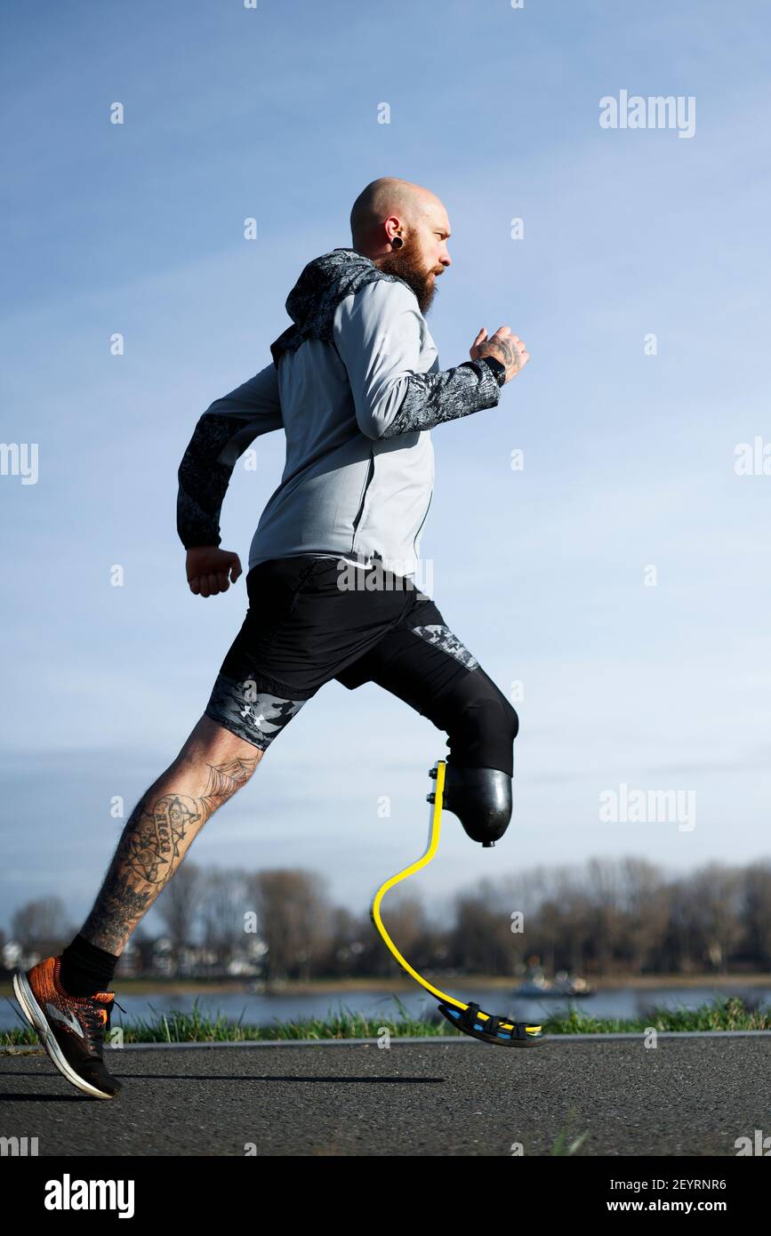 run training with sports prosthesis Stock Photo - Alamy
