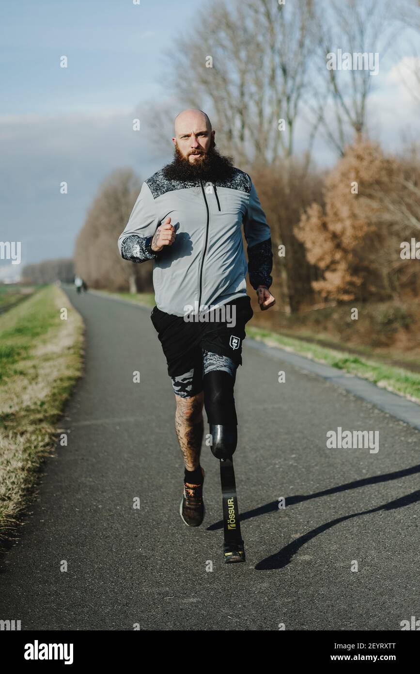 run training with sports prosthesis Stock Photo - Alamy