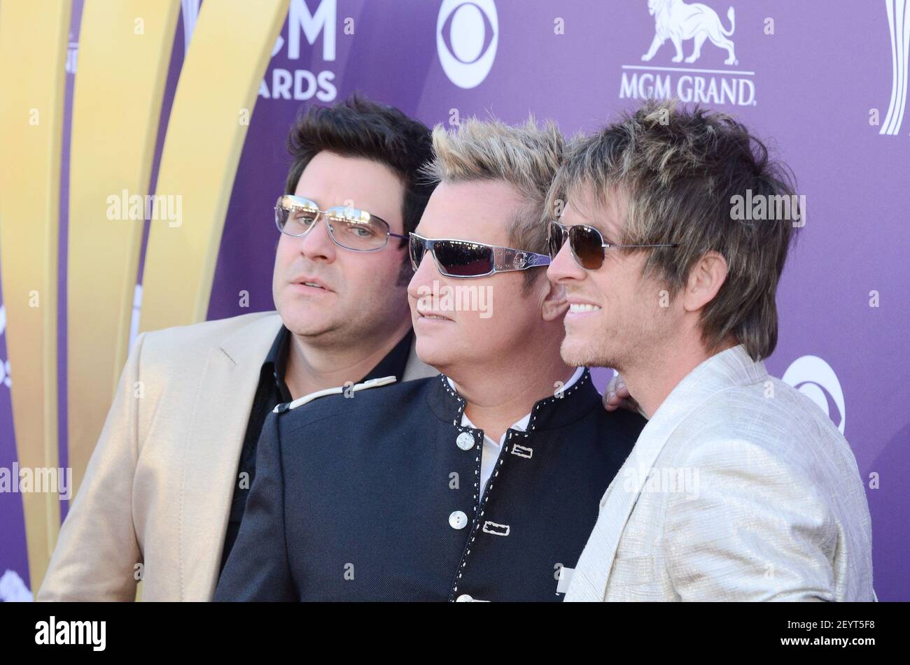 Jay DeMarcus, Gary LeVox and Joe Don Rooney of the band Rascal Flatts ...