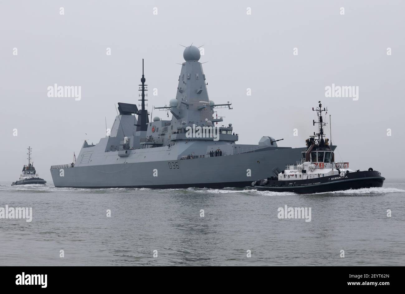The tugs SD BOUNTIFUL and SD INDULGENT escort the Royal Navy Daring ...