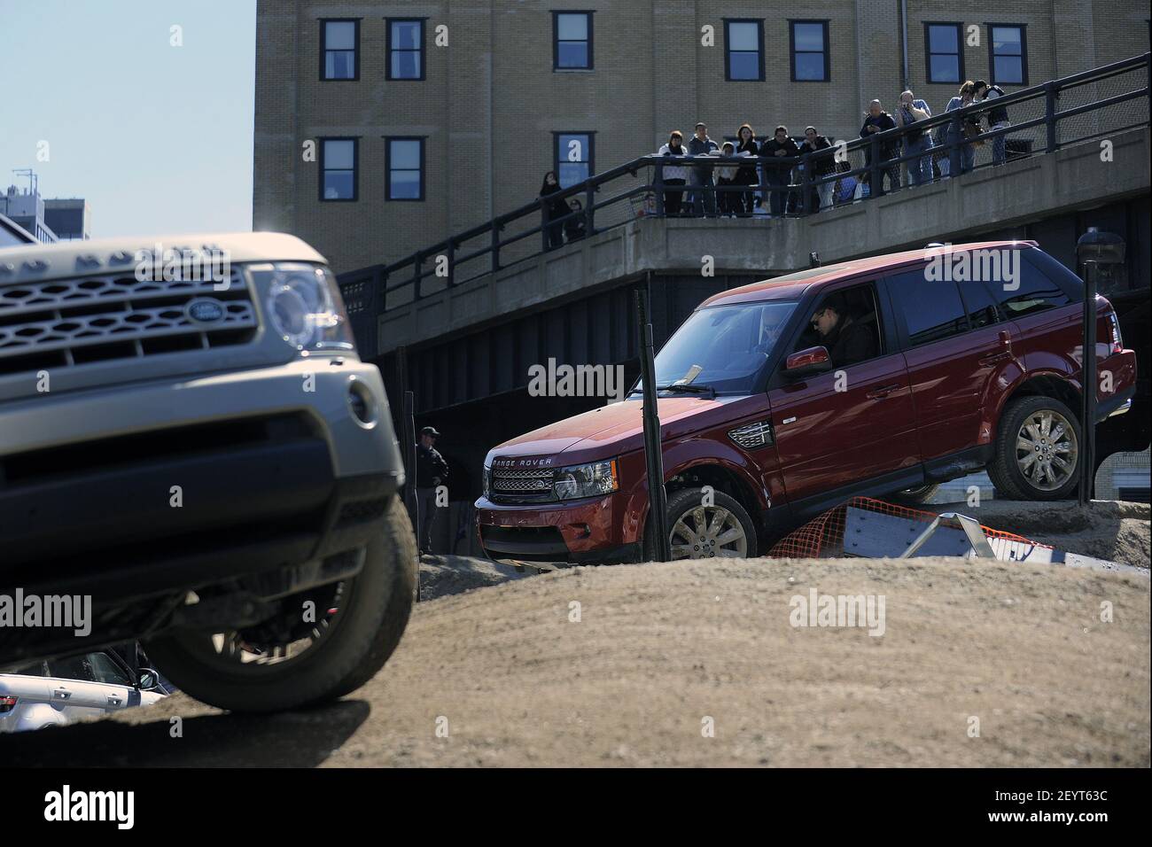 0 April 2012 - New York - Pedestrians on the High Line Park watch a new ...
