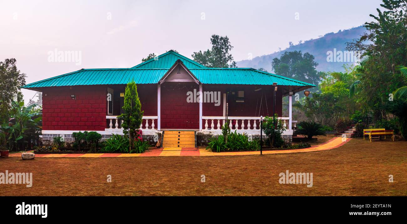 Indian house with traditional roof design at coastal side of ...