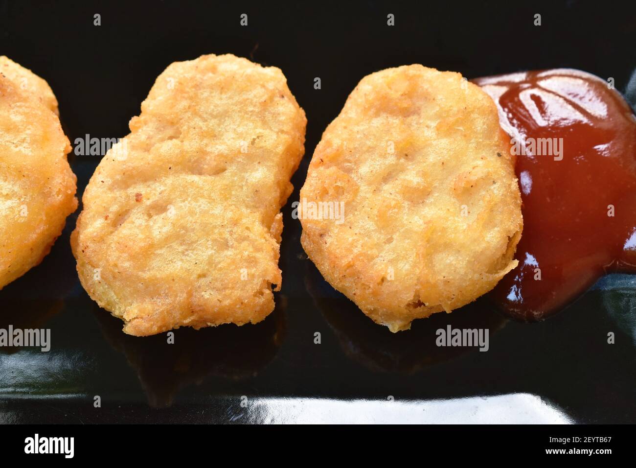 Chicken nugget dipping hi-res stock photography and images - Alamy