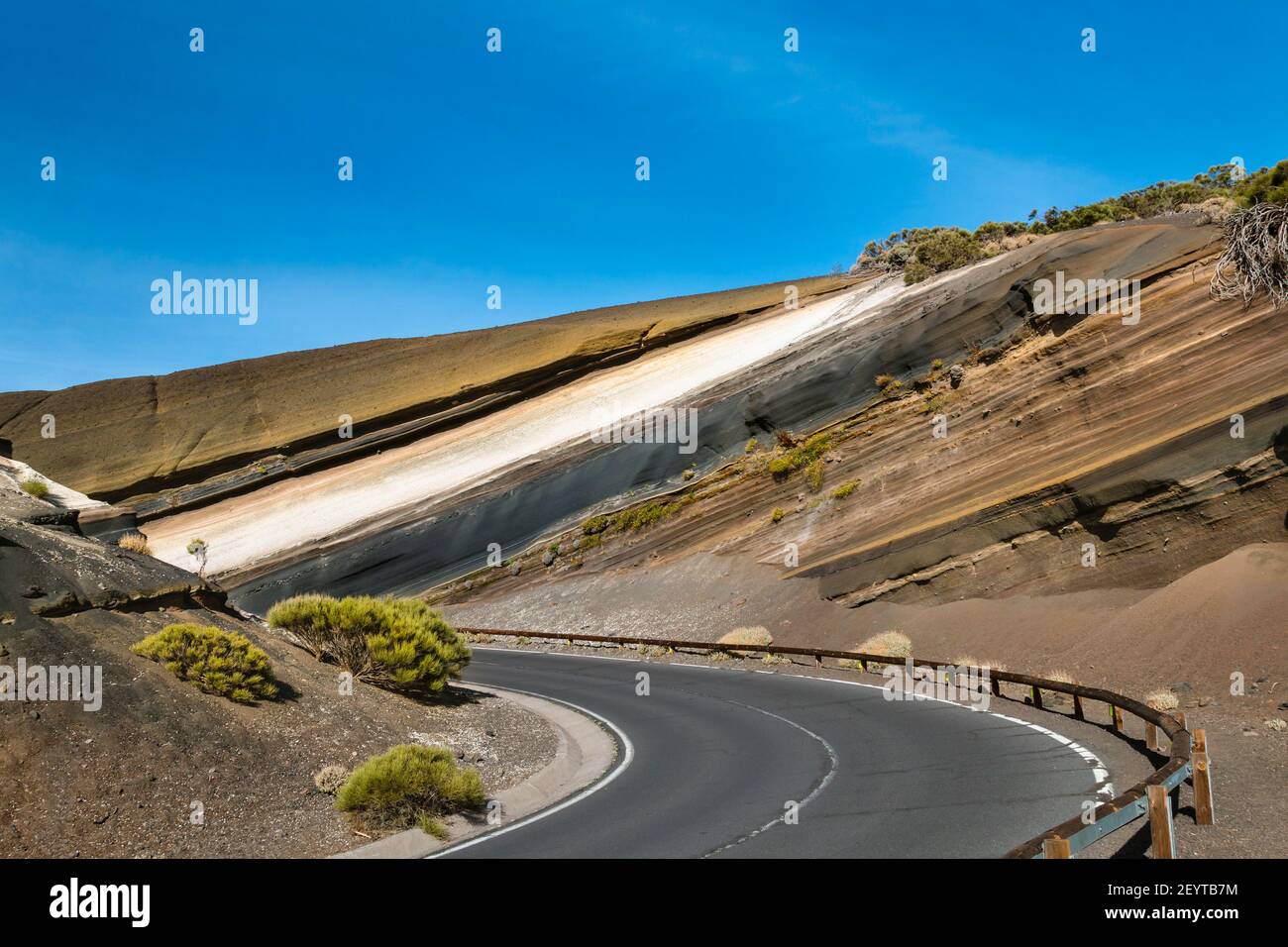 Colorful volcanic rock layers in a bend of the TF24 road in Tenerife, Spain Stock Photo - Alamy