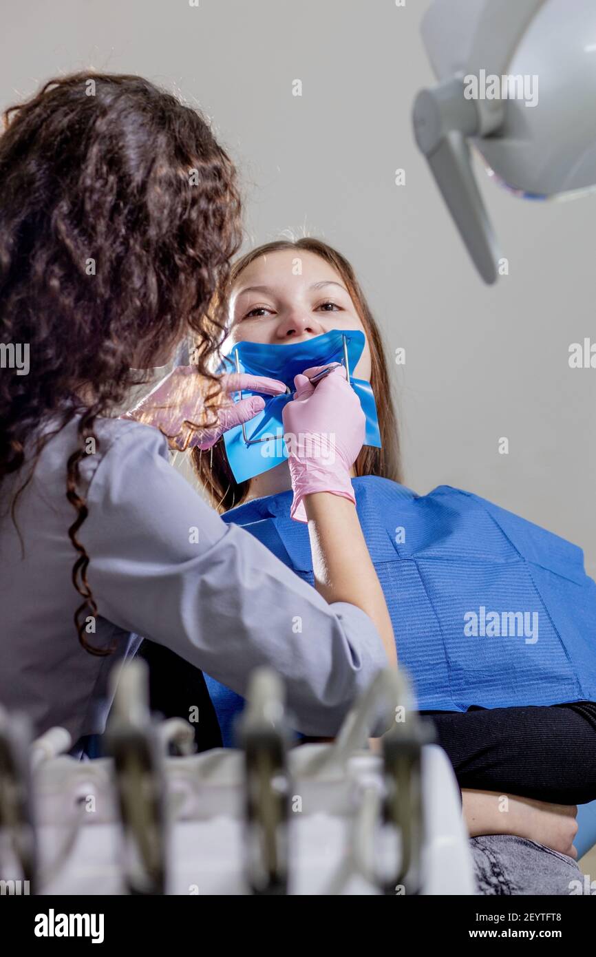 Laser bleaching teeth at dantist room. Teeth whitening for woman ...