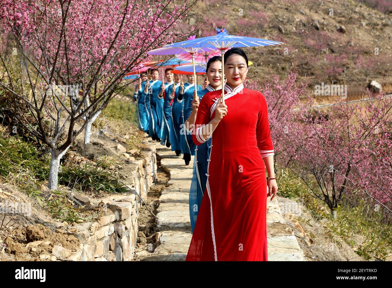 LIANYUNGANG, CHINA - MARCH 6, 2021 - Cheongsam lovers show their ...