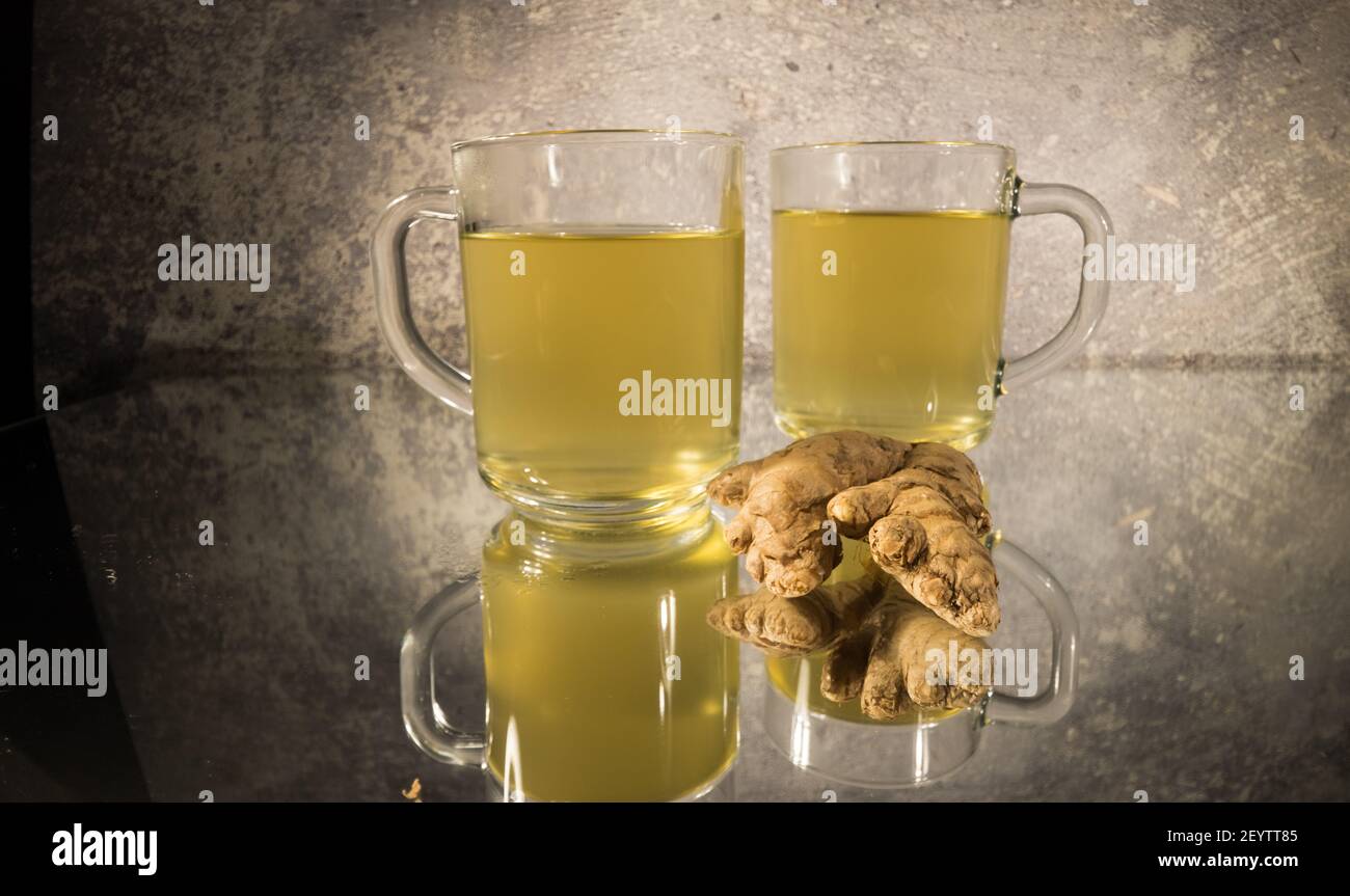 Ginger Tea on a table in close-up view Stock Photo - Alamy