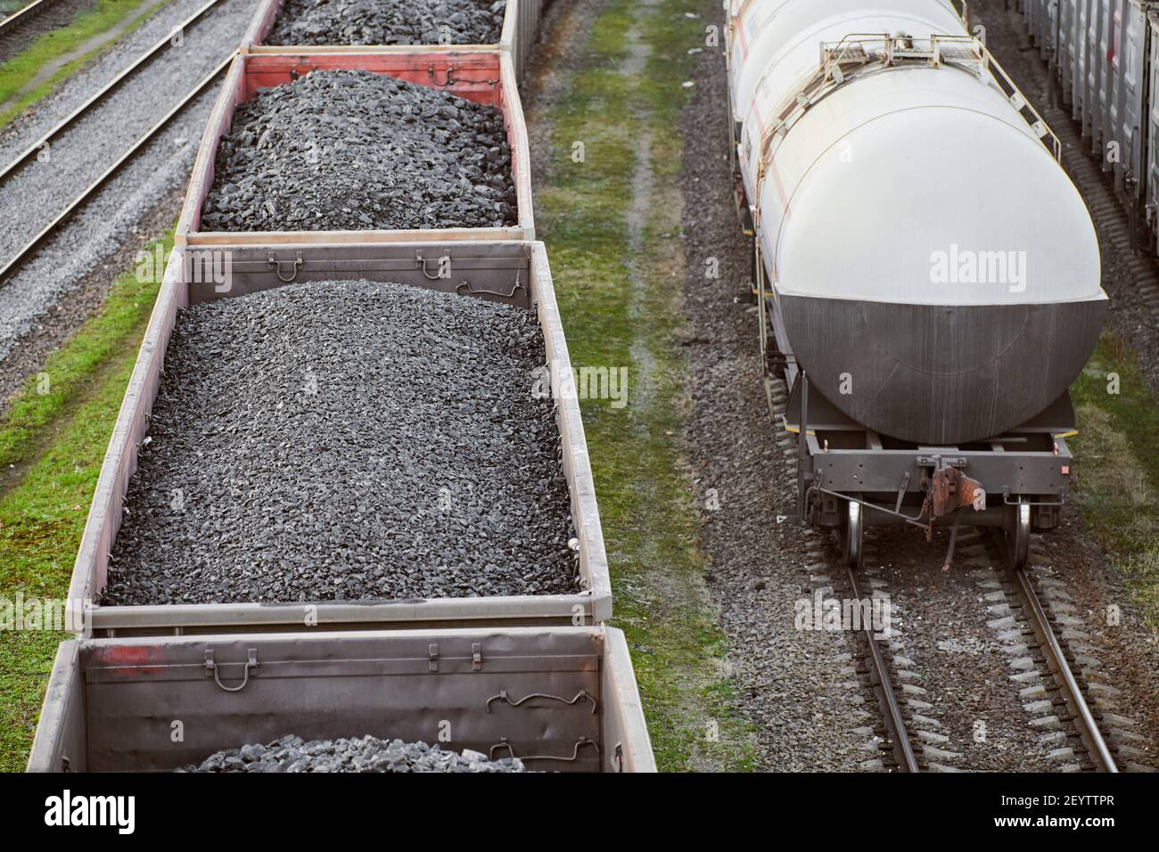 Railway cargo cars loaded with coal. Freight train transporting coal ...