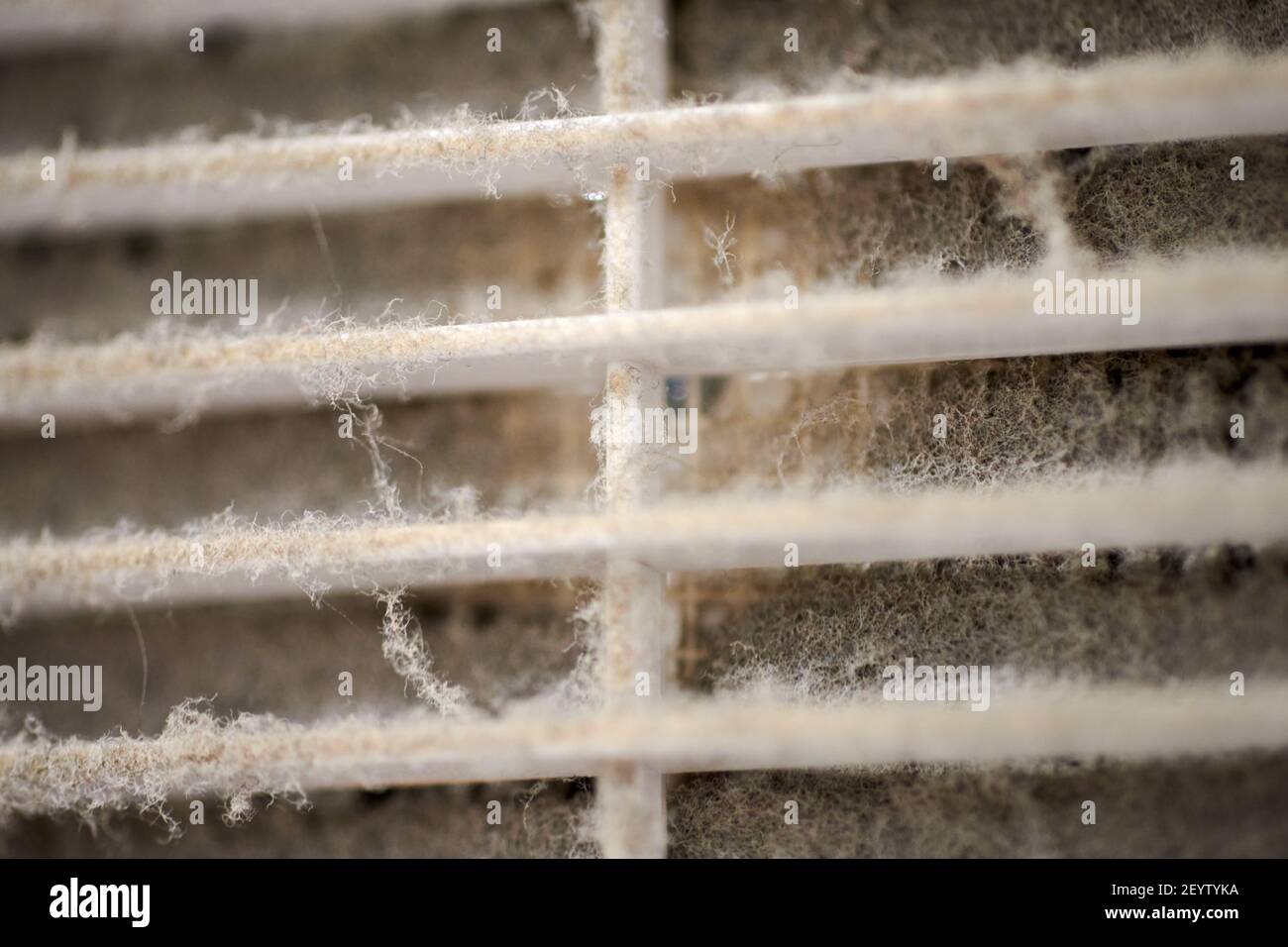 Extremely dirty air ventilation grill of HVAC with dusty clogged filter ...