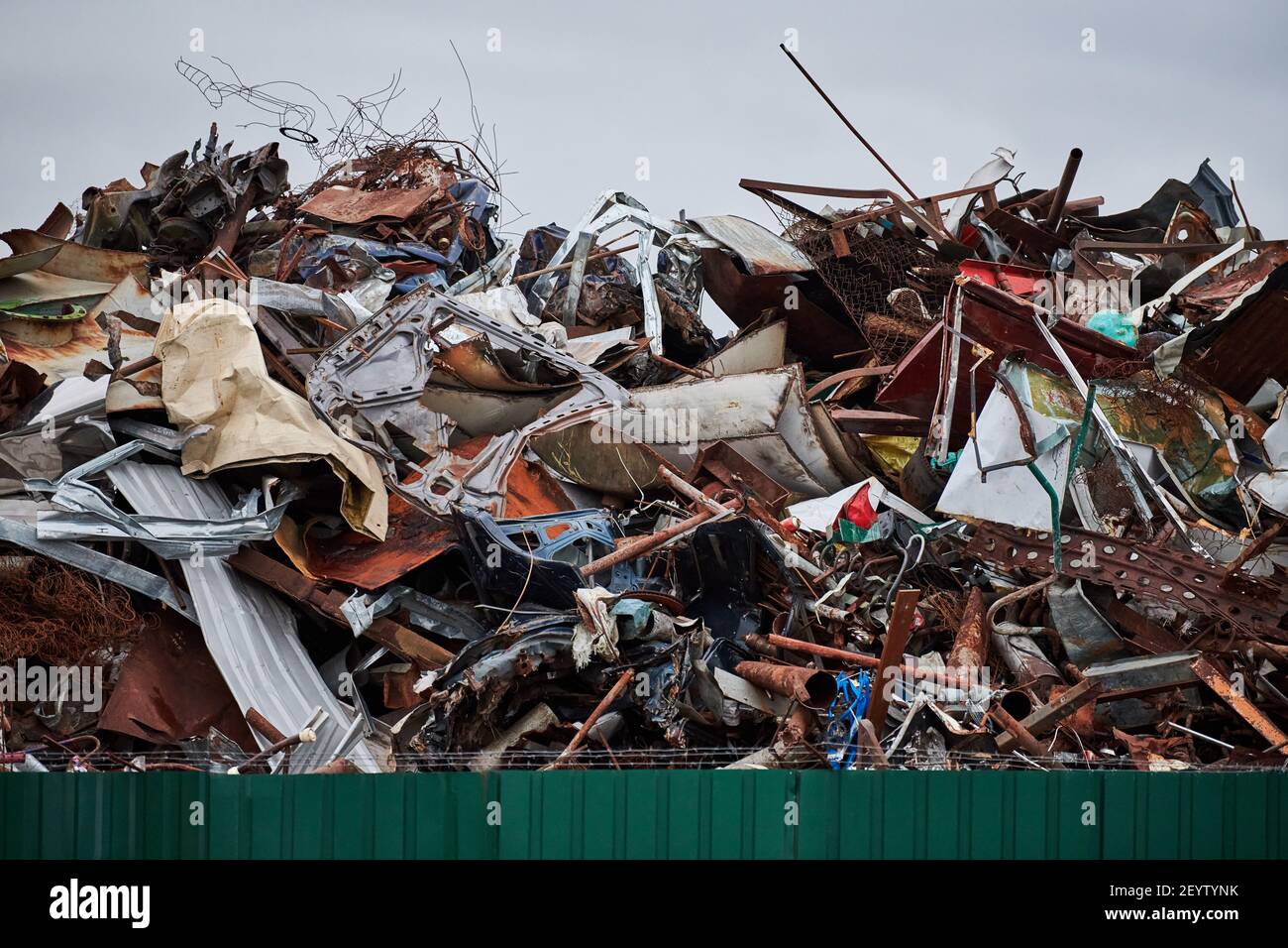 Metal scrap waste dump for recycling. City fenced landfill. Iron ...