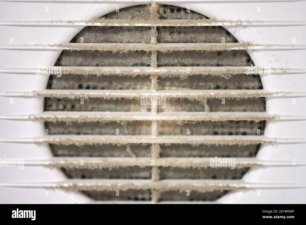 Extremely dirty air ventilation grill of HVAC with dusty clogged filter ...