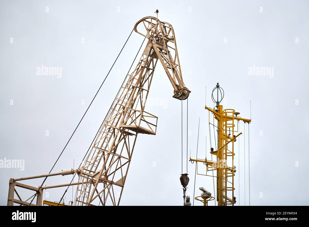 Massive harbor crane in port. Heavy load dockside crane in seaport ...