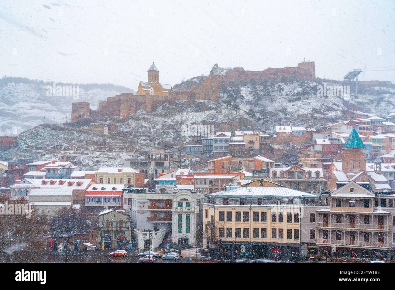 Tbilisi, Georgia - 24 February, 2021: Old Tbilisis with covered snow ...