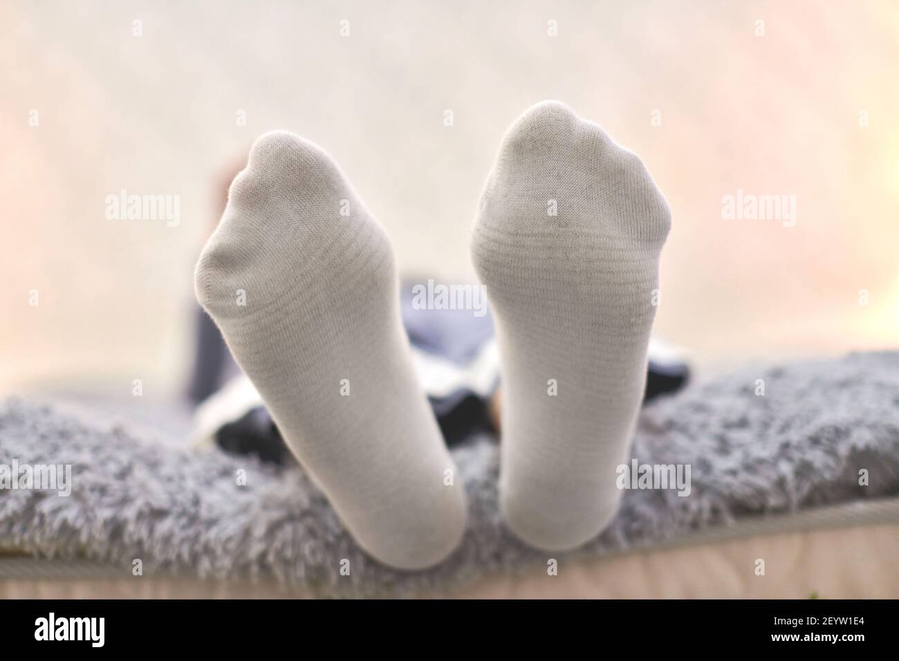 Woman Socks Couch High Resolution Stock Photography and Images - Alamy