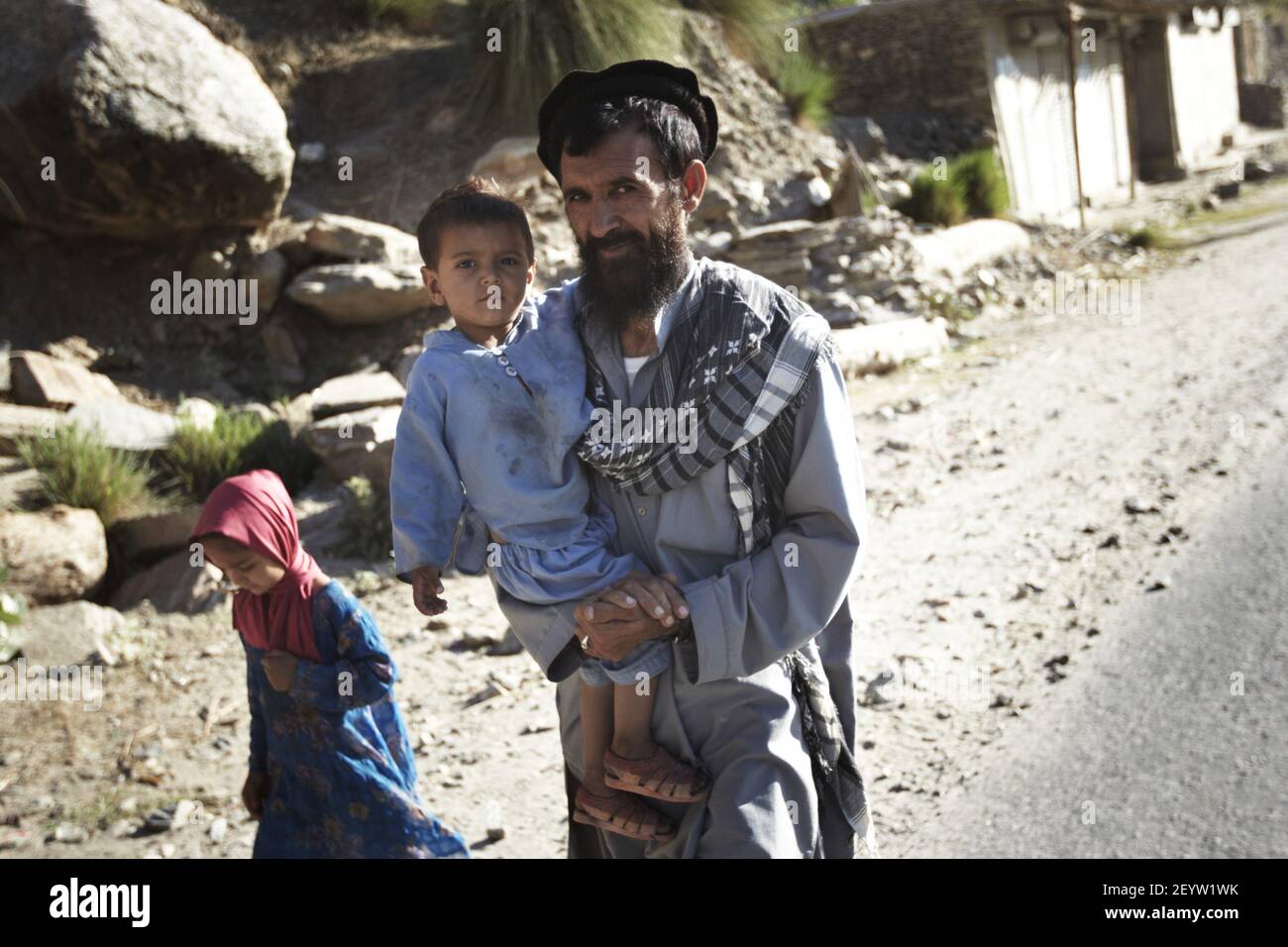 14 June 2012 - Pech Valley, Afghanistan - A Afghan father and his two ...