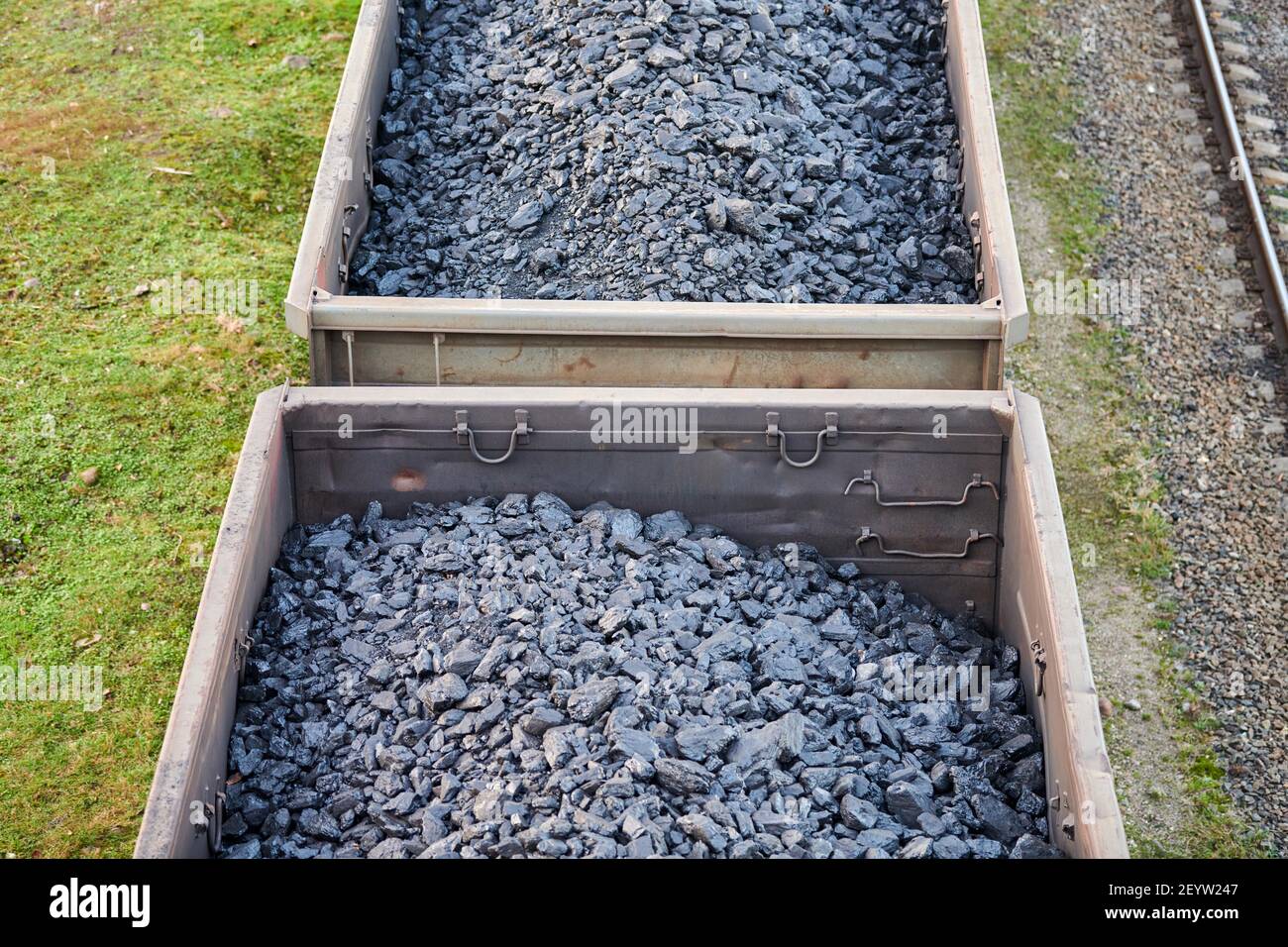Railway cargo cars loaded with coal. Freight train transporting coal ...