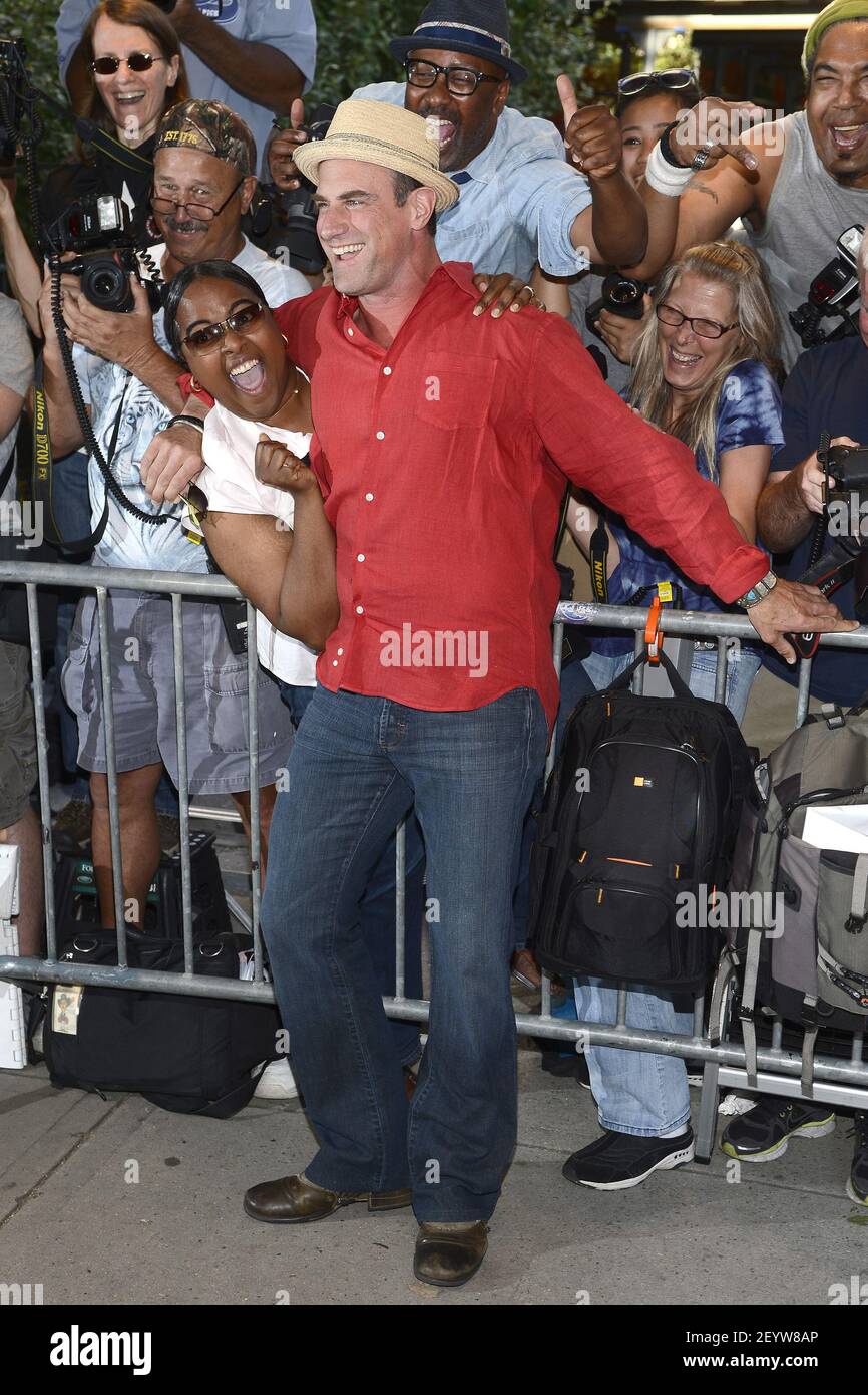27 June 2012 - New York - Actor Christopher Meloni is hugged by ...