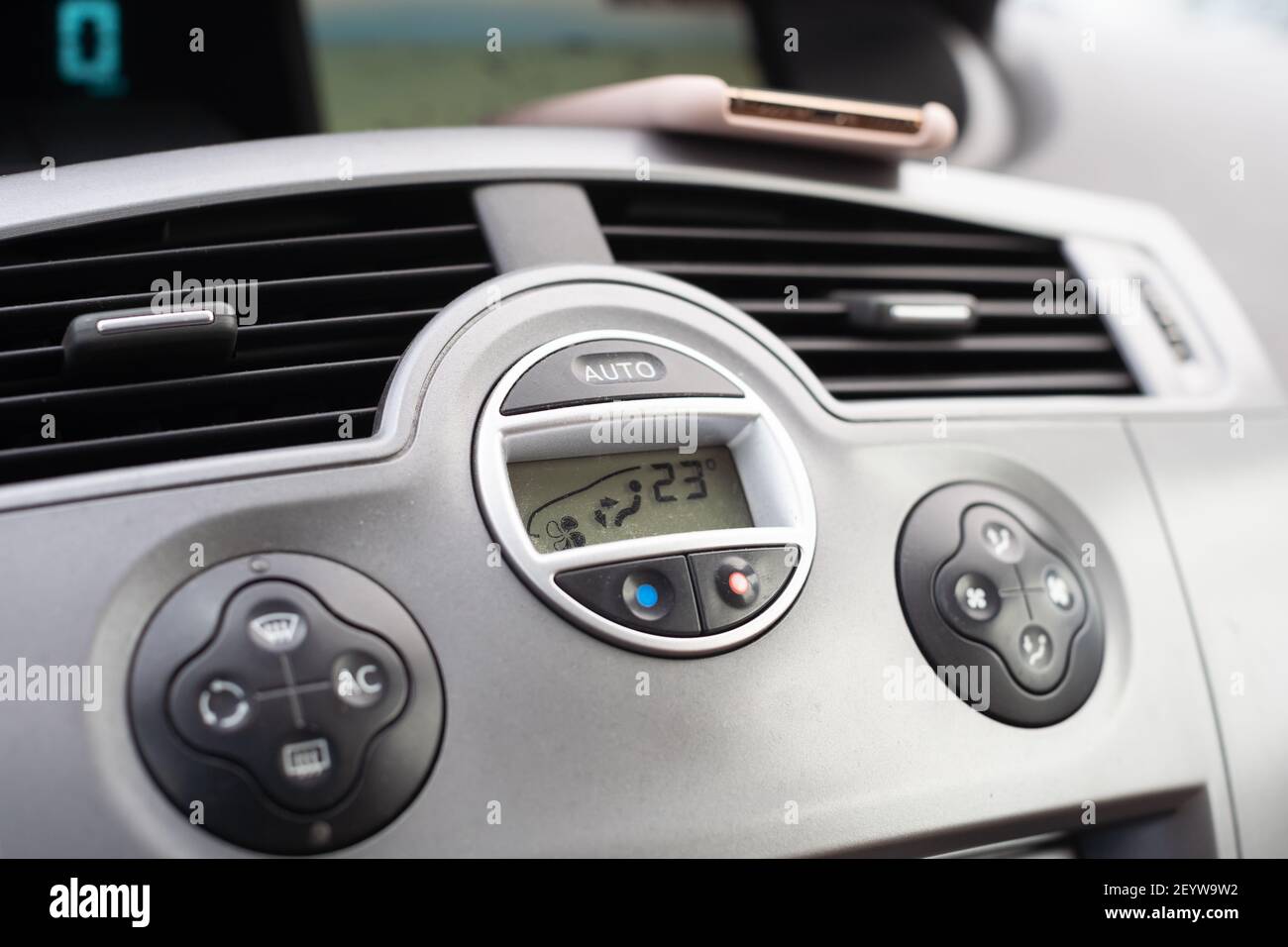 Close-up view of the heating and air conditioning control panel in a ...