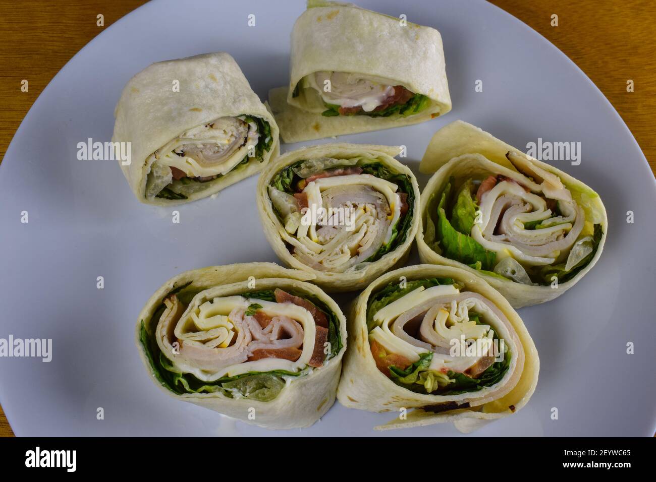 turkey pin wheel sandwich consisting of turkey, cheese and lettuce ...