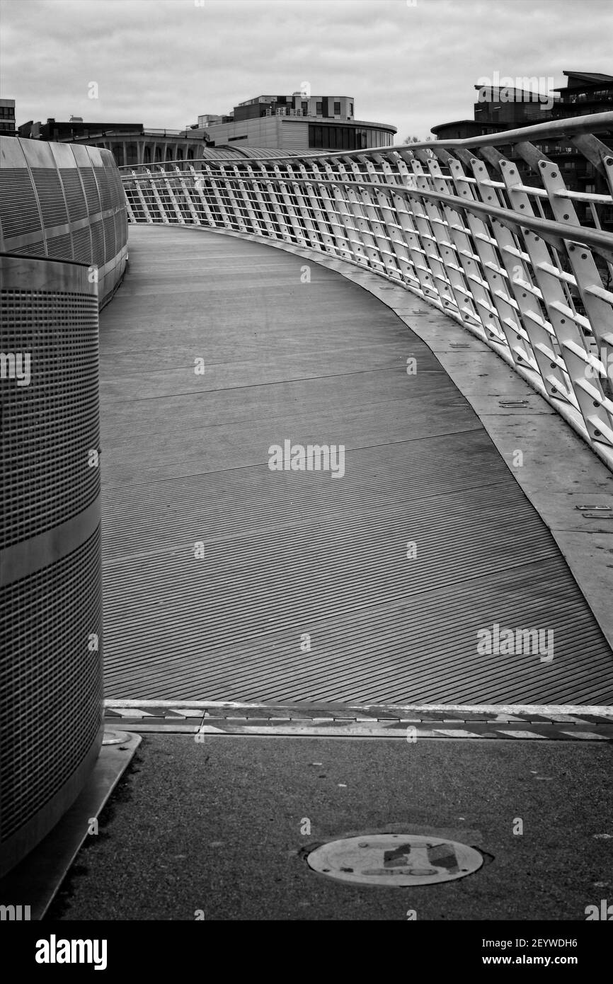 The footpath and barriers of the Gateshead Millennium Bridge in North ...