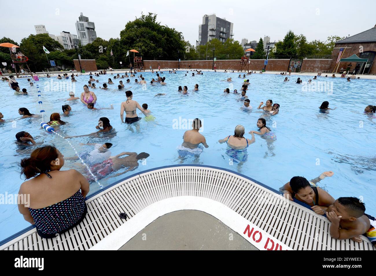 13 July 2012 - New York - Bathers swim and play inside the newly ...