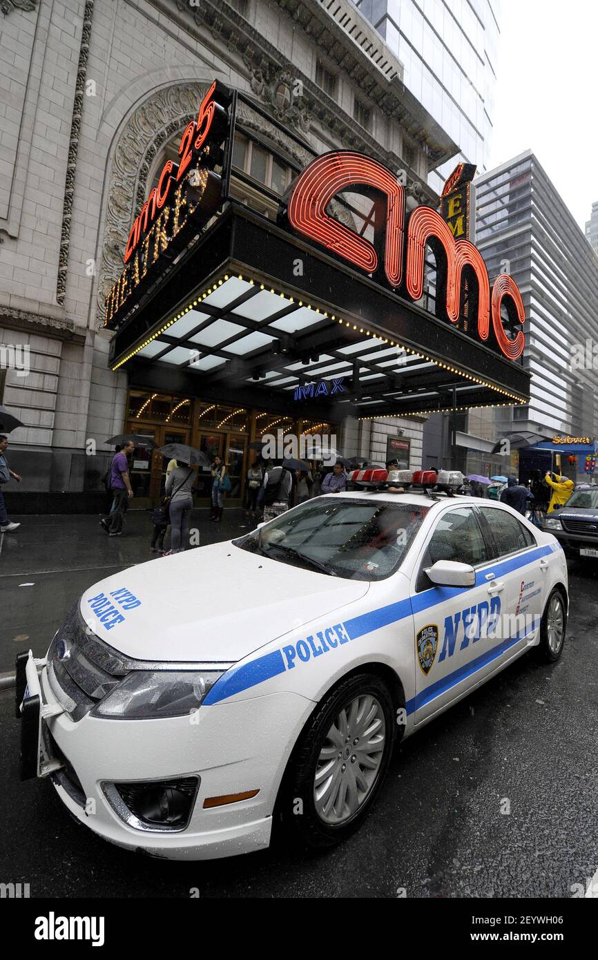 20 July 2012 - New York - An NYPD car is stationed in front of an AMC ...