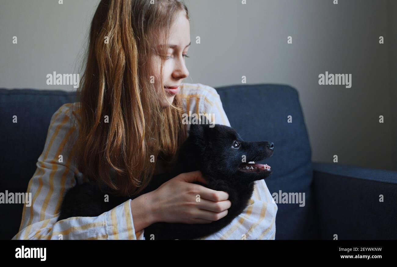 Black teen girl dog hi-res stock photography and images - Alamy