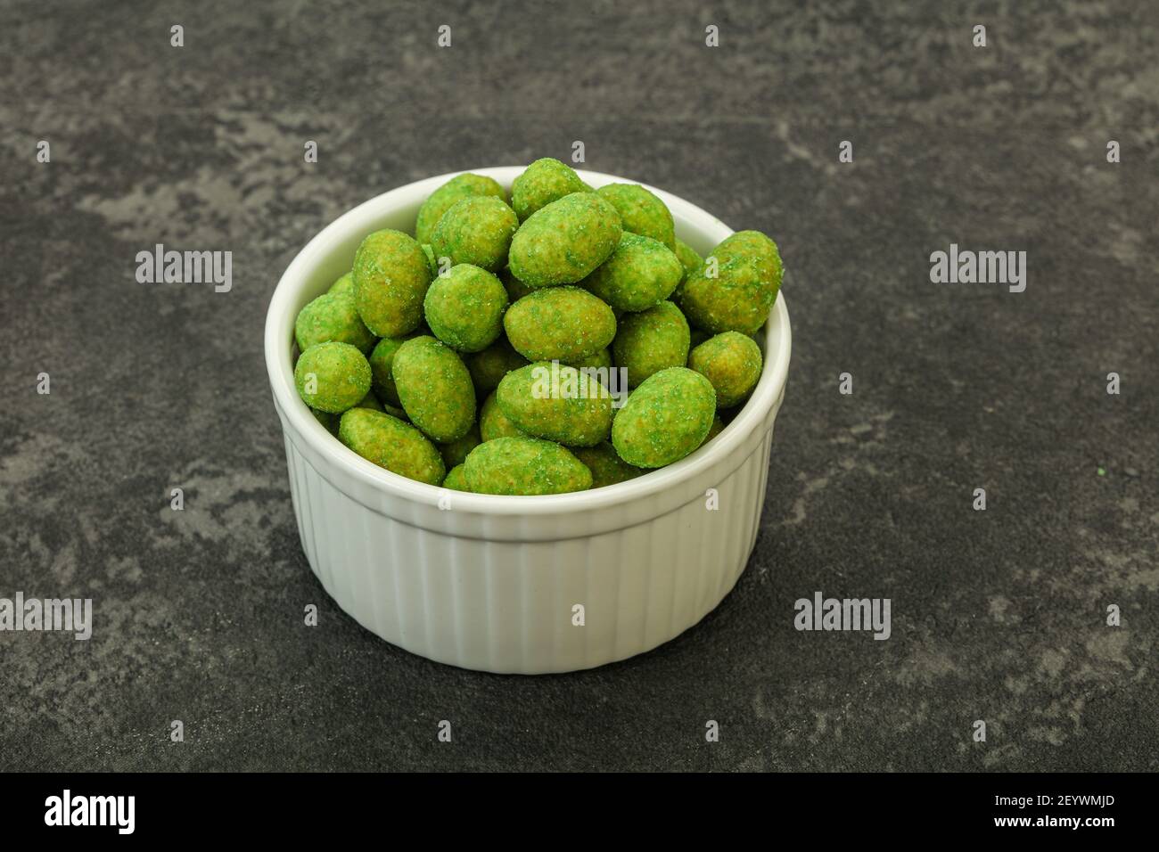 Spicy wasabi peanuts snack in the bowl Stock Photo - Alamy