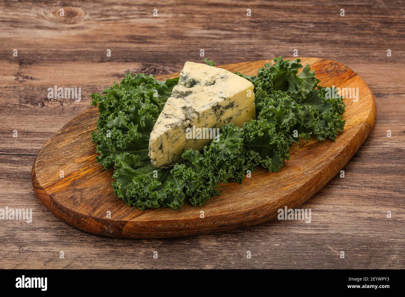 Dairy Blue cheese triangle with mold Stock Photo - Alamy