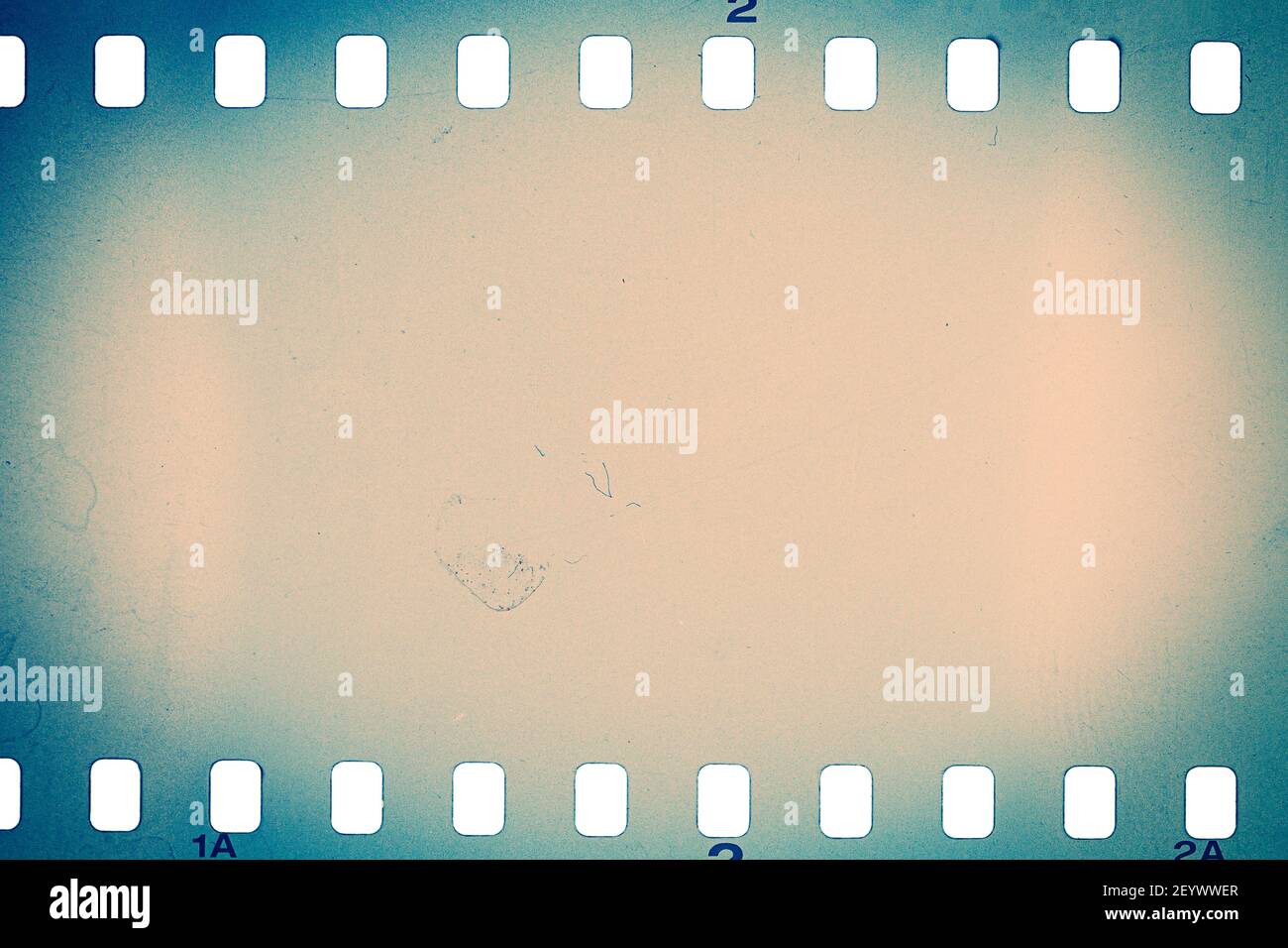 Dusty and grungy 35mm film texture or surface. Perforated camera film ...