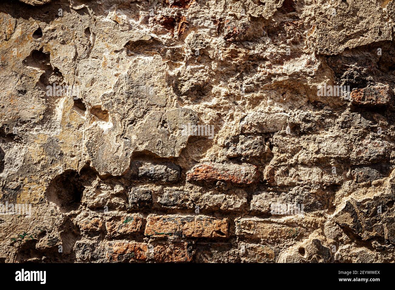 Old brick and plaster wall texture background. Painted distressed wall ...