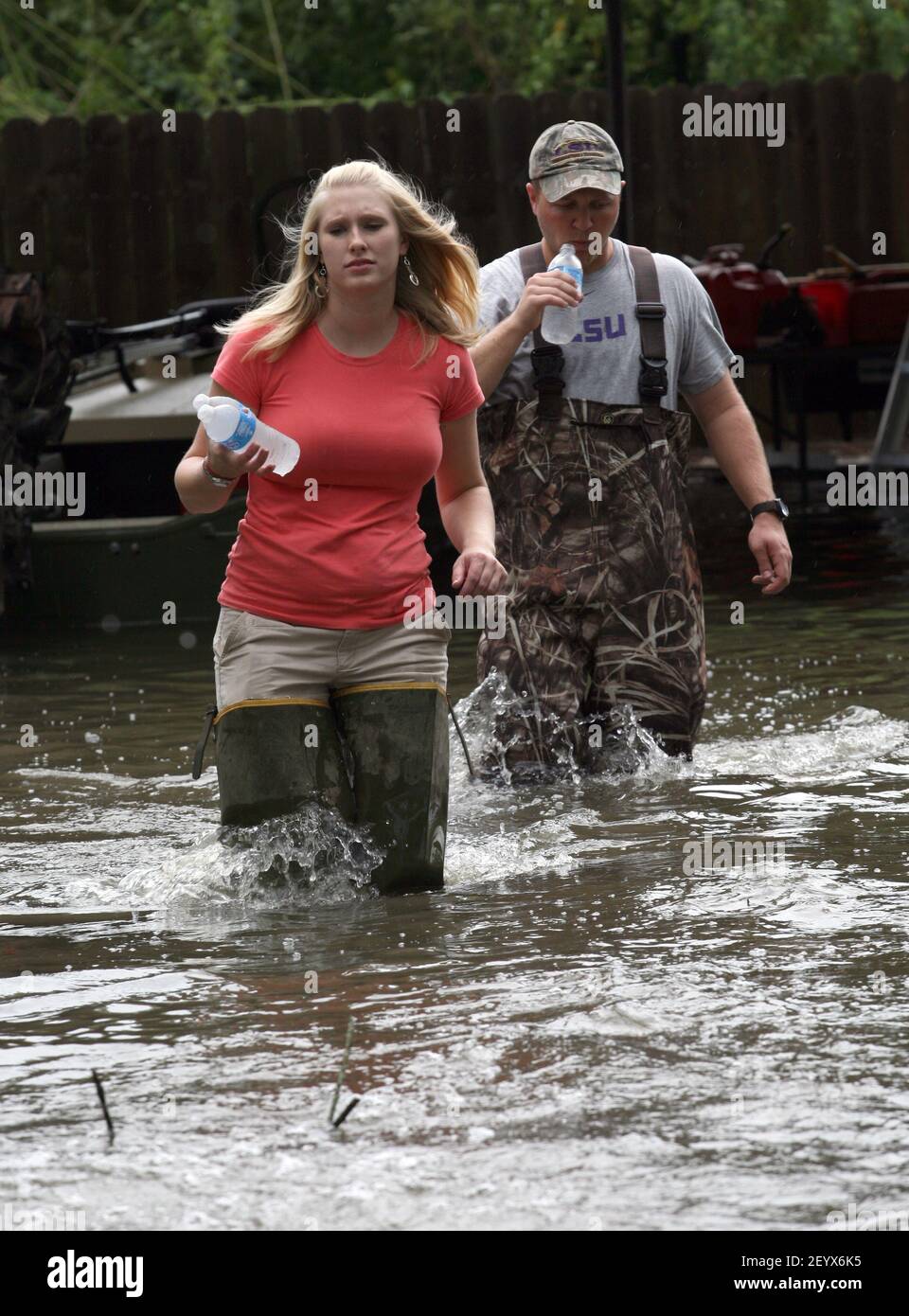 30 August 2012 - Laplace, Louisiana - Britney and Timothy Brignac wade ...