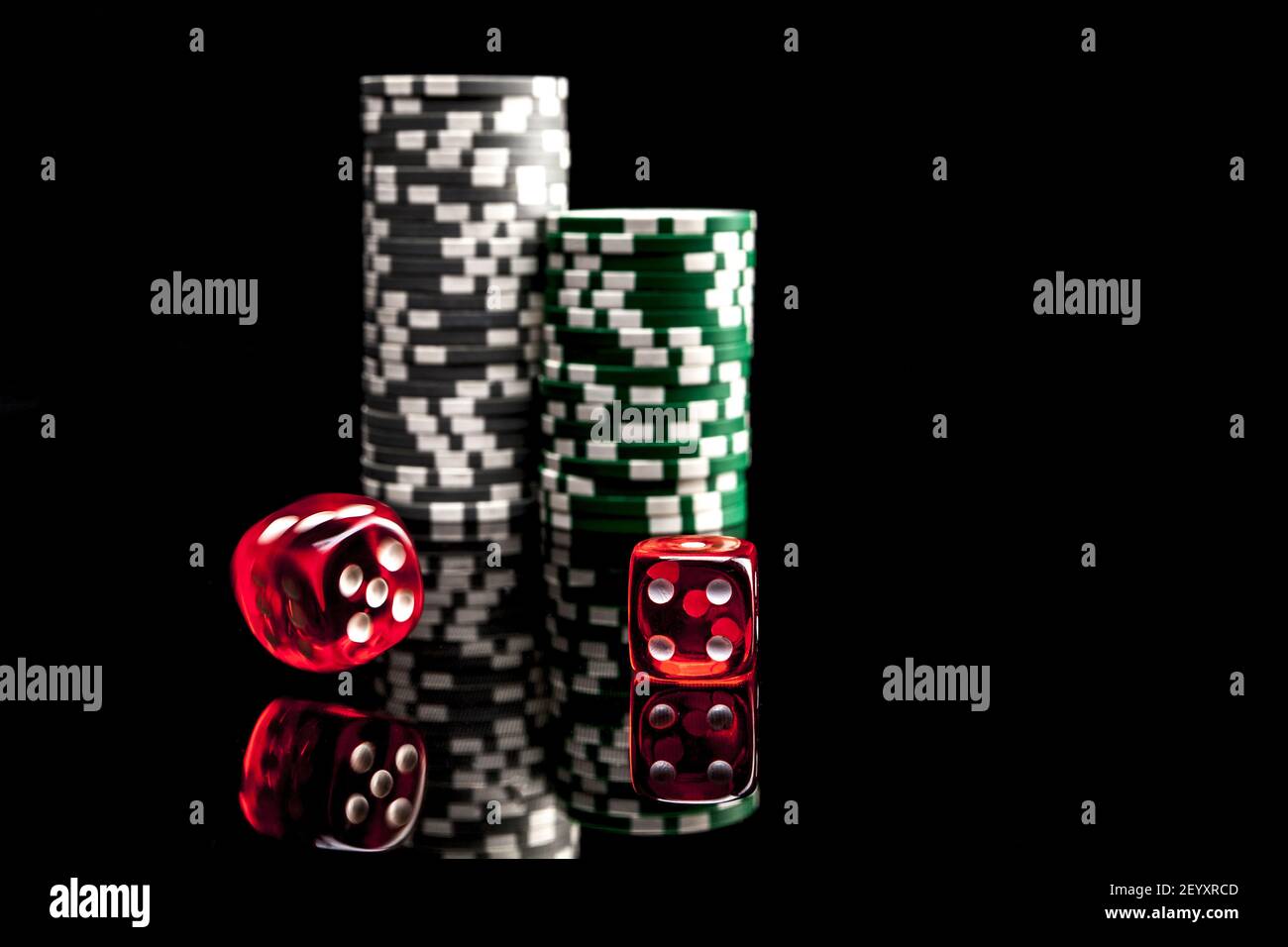 Red Dice and Green Chips Stock Photo - Alamy