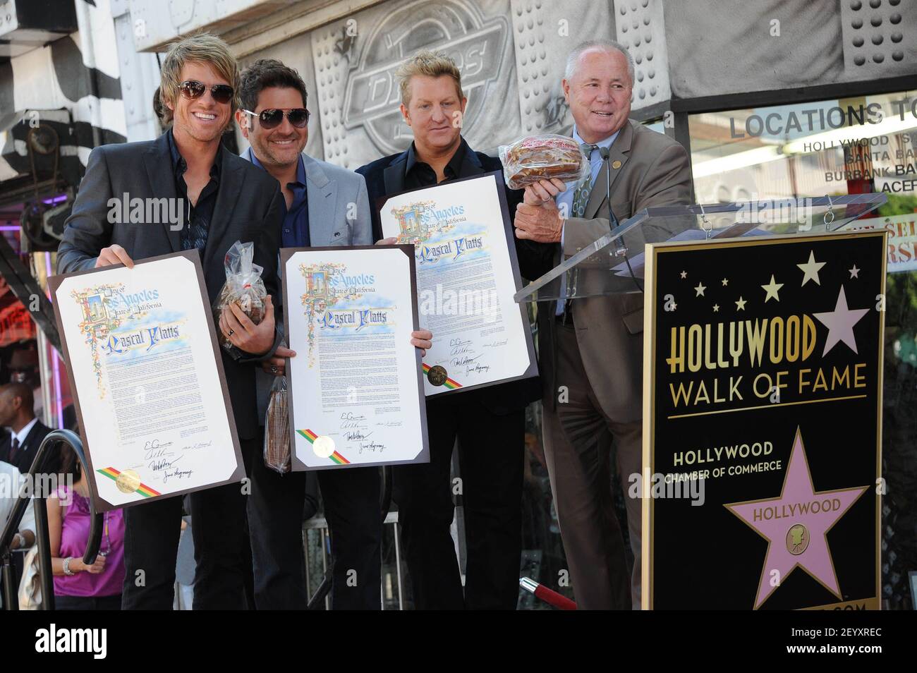 Gary LeVox, Jay Demarcus and Joe Don Rooney of Rascal Flatts with Tom ...