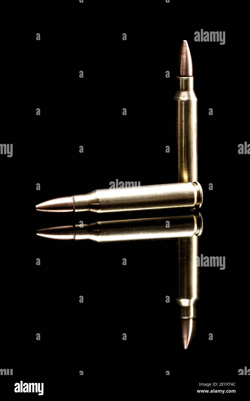 Shiny Gold Bullets Stock Photo - Alamy