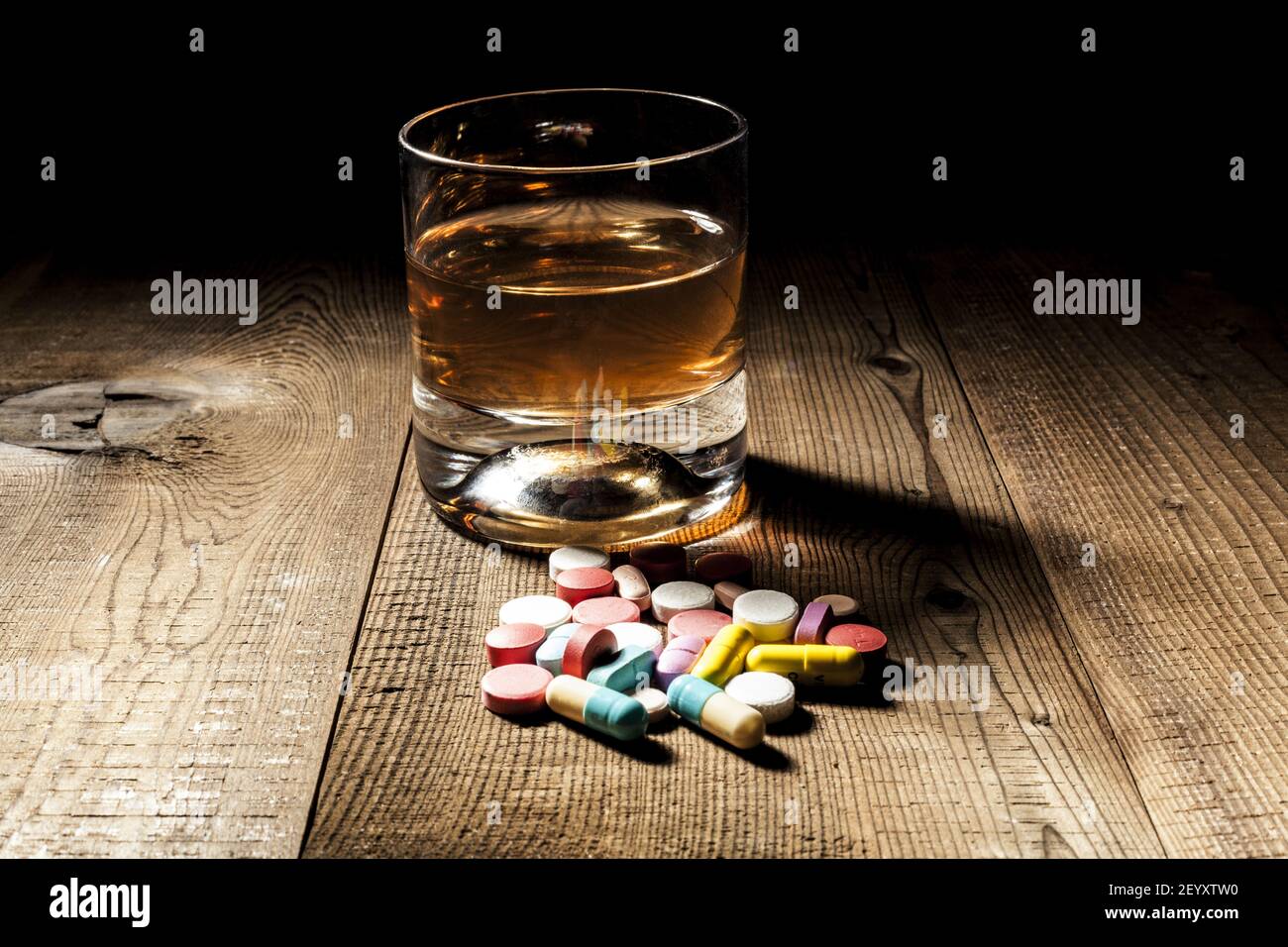 Danger by alcohol and tablets hi-res stock photography and images - Alamy