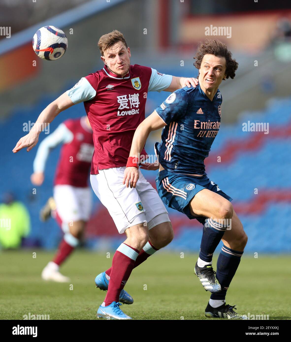 Arsenal's David Luiz and Burnley's Chris Wood battle for the ball ...
