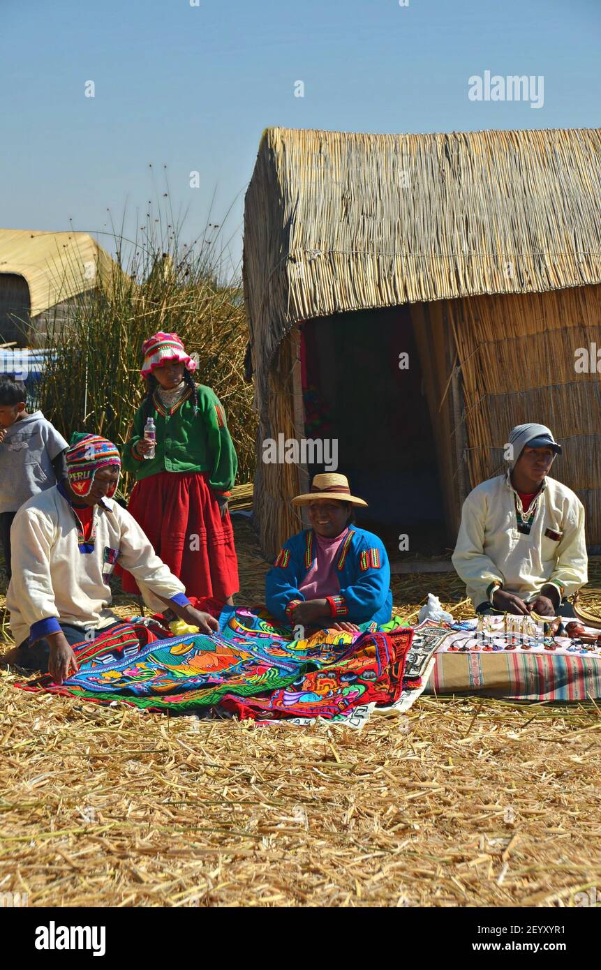 Indigenous Uru people on a self fashioned floating island selling their ...