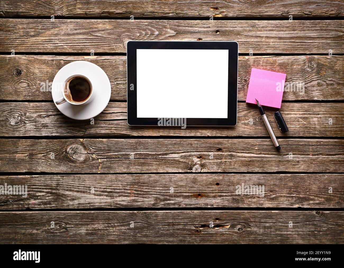 Digital tablet computer with note paper Stock Photo - Alamy