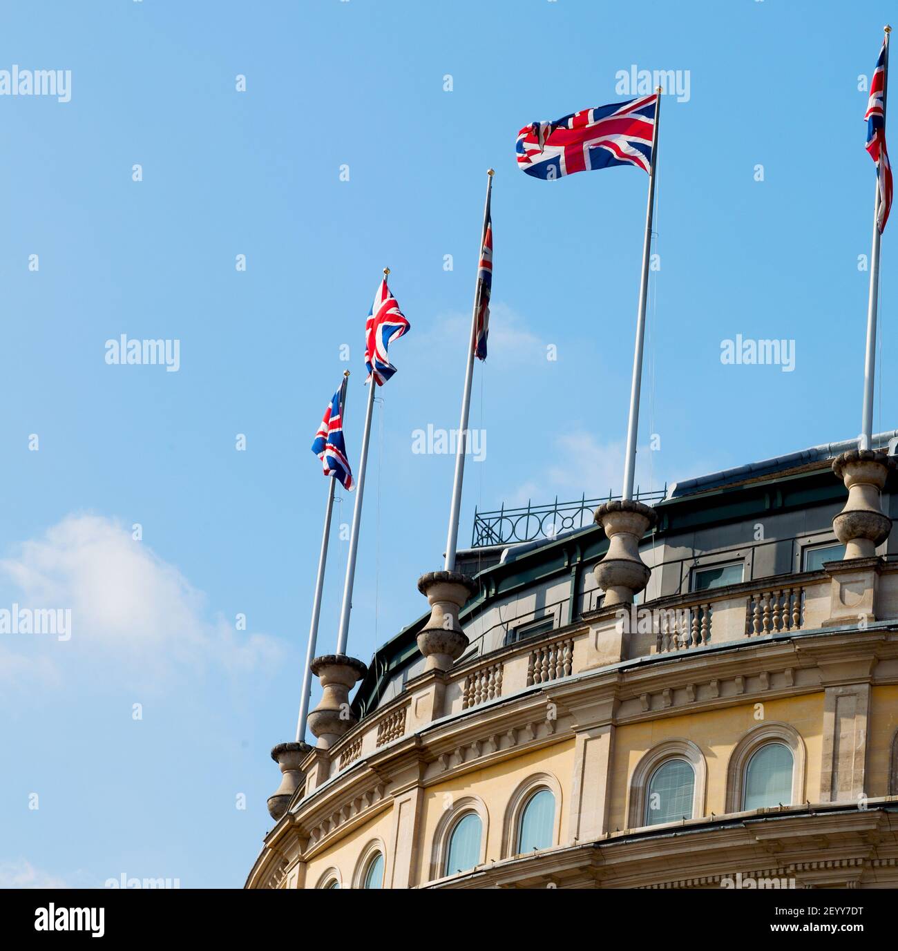 Old english flag in the wall and sky Stock Photo - Alamy