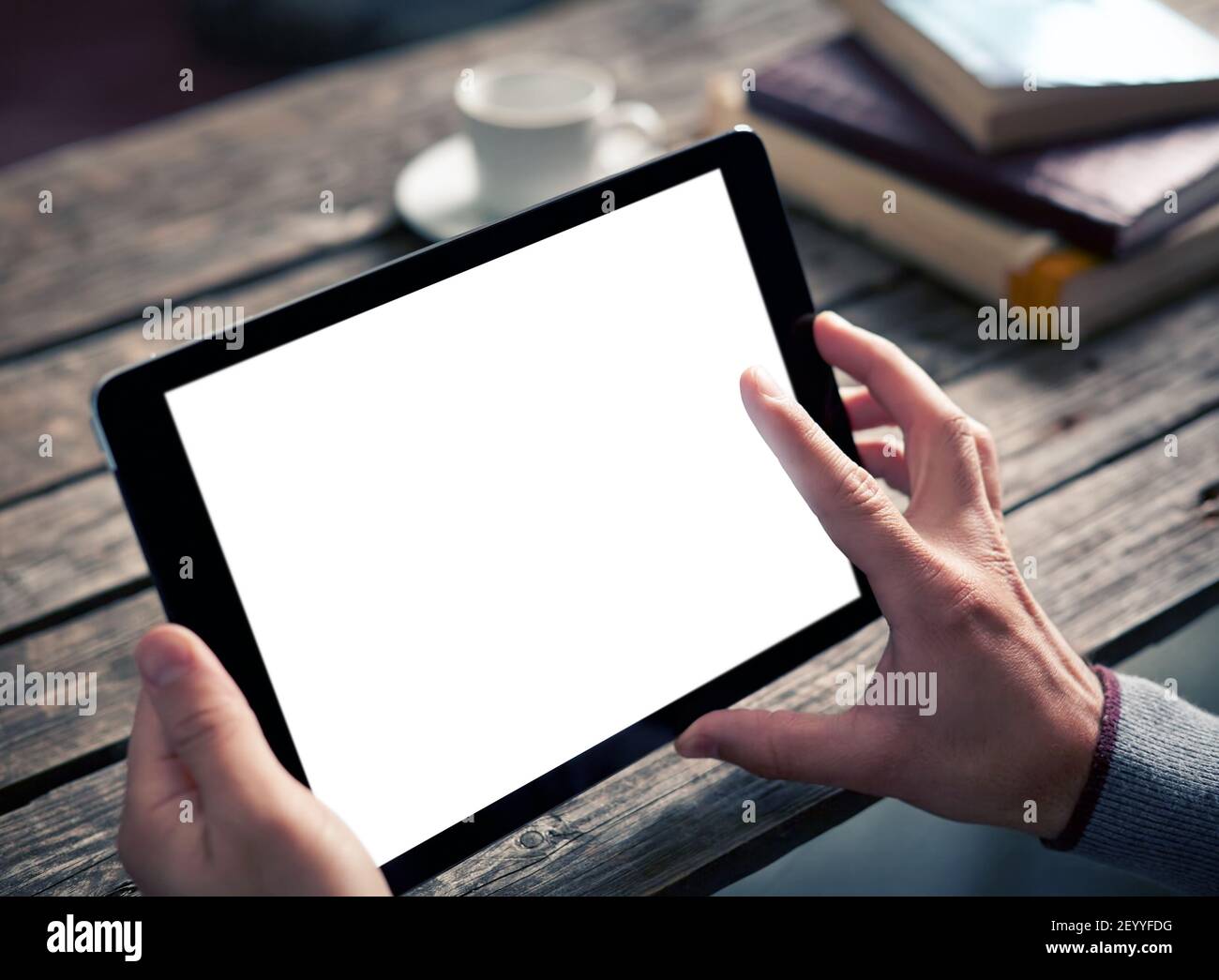 Digital tablet in male hands over background Stock Photo - Alamy
