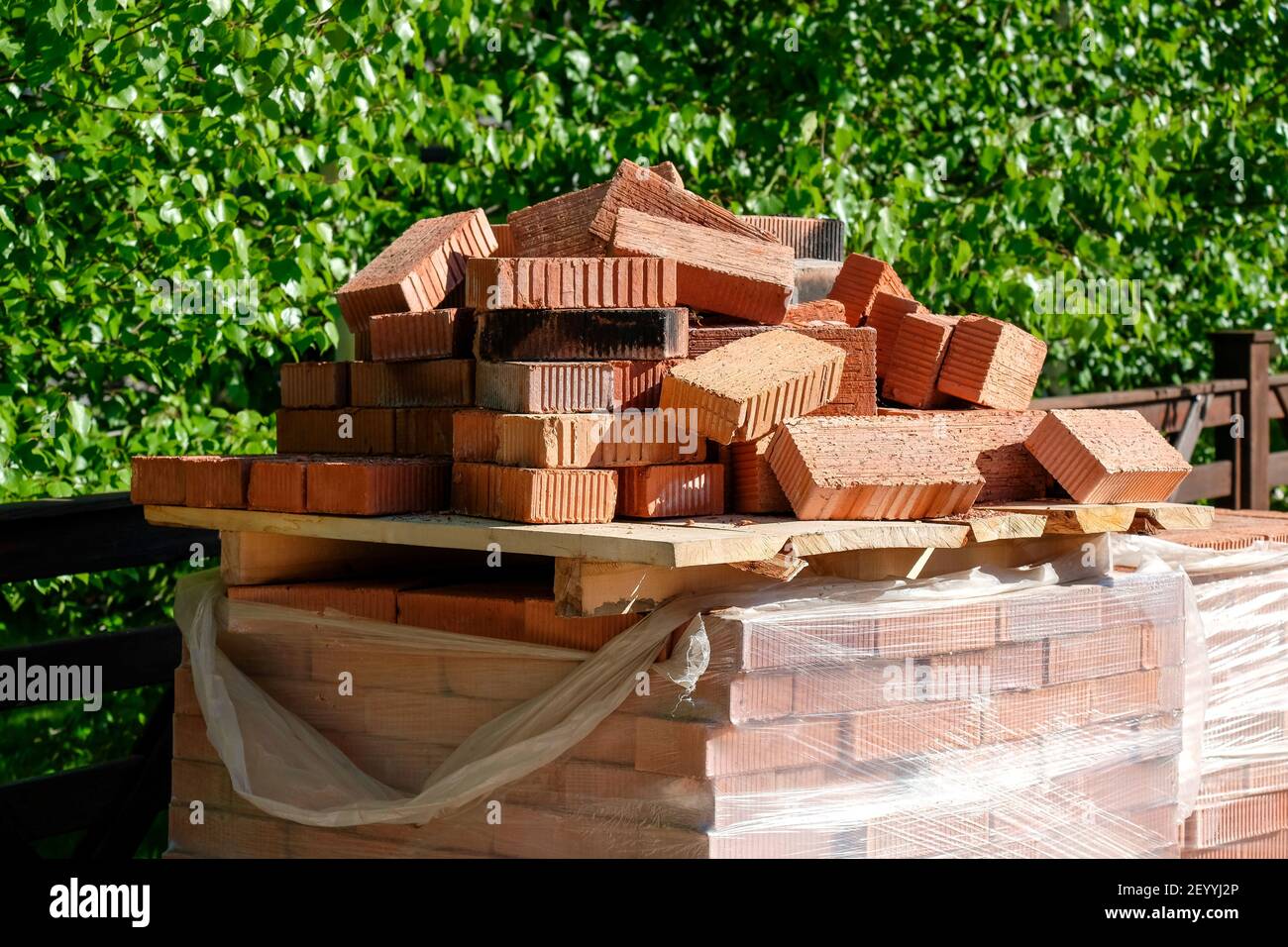 Bricks in the summer at a construction site. Block on the street Stock ...